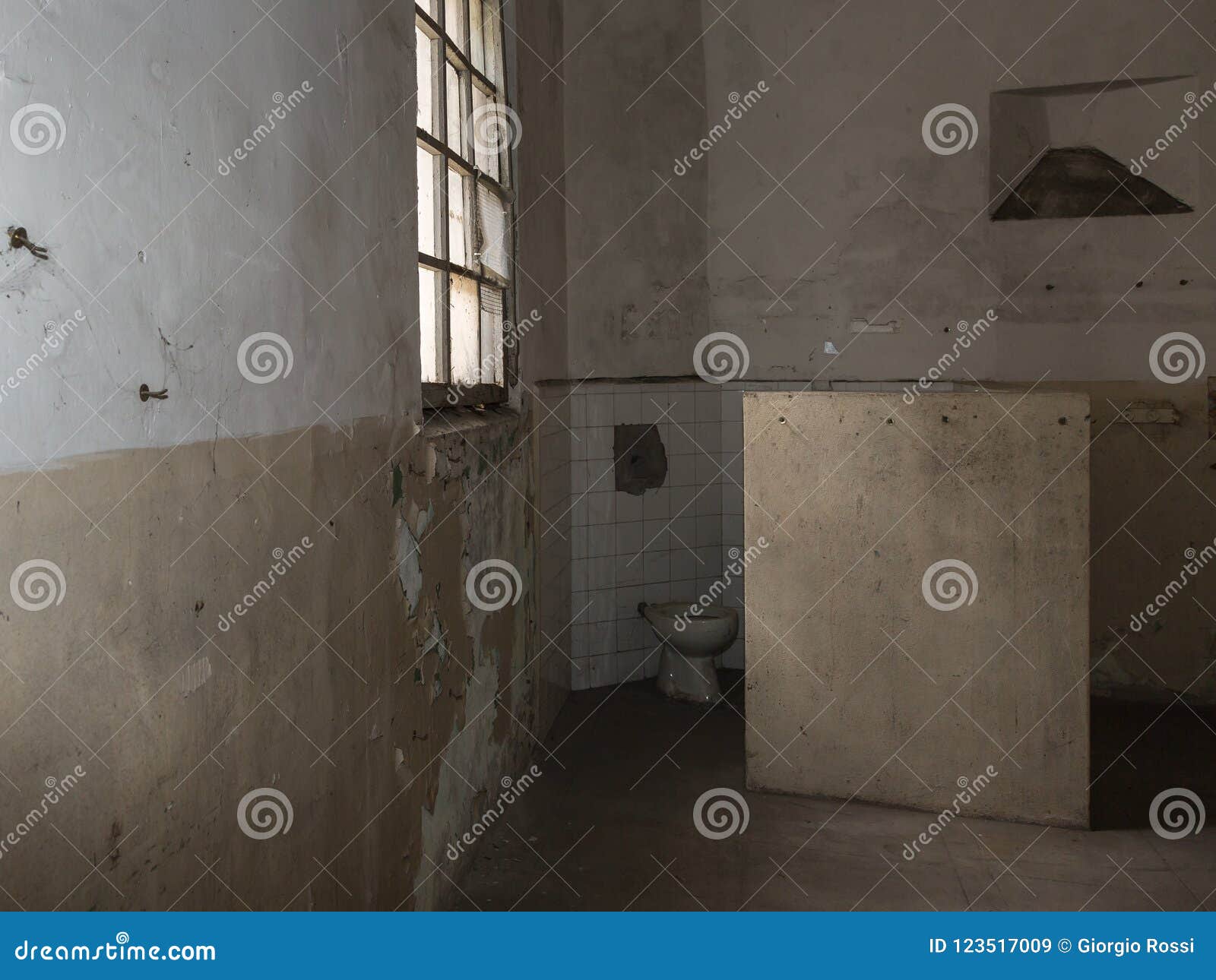 Empty Room with a Toilet in an Old Prison Editorial Stock Image - Image ...