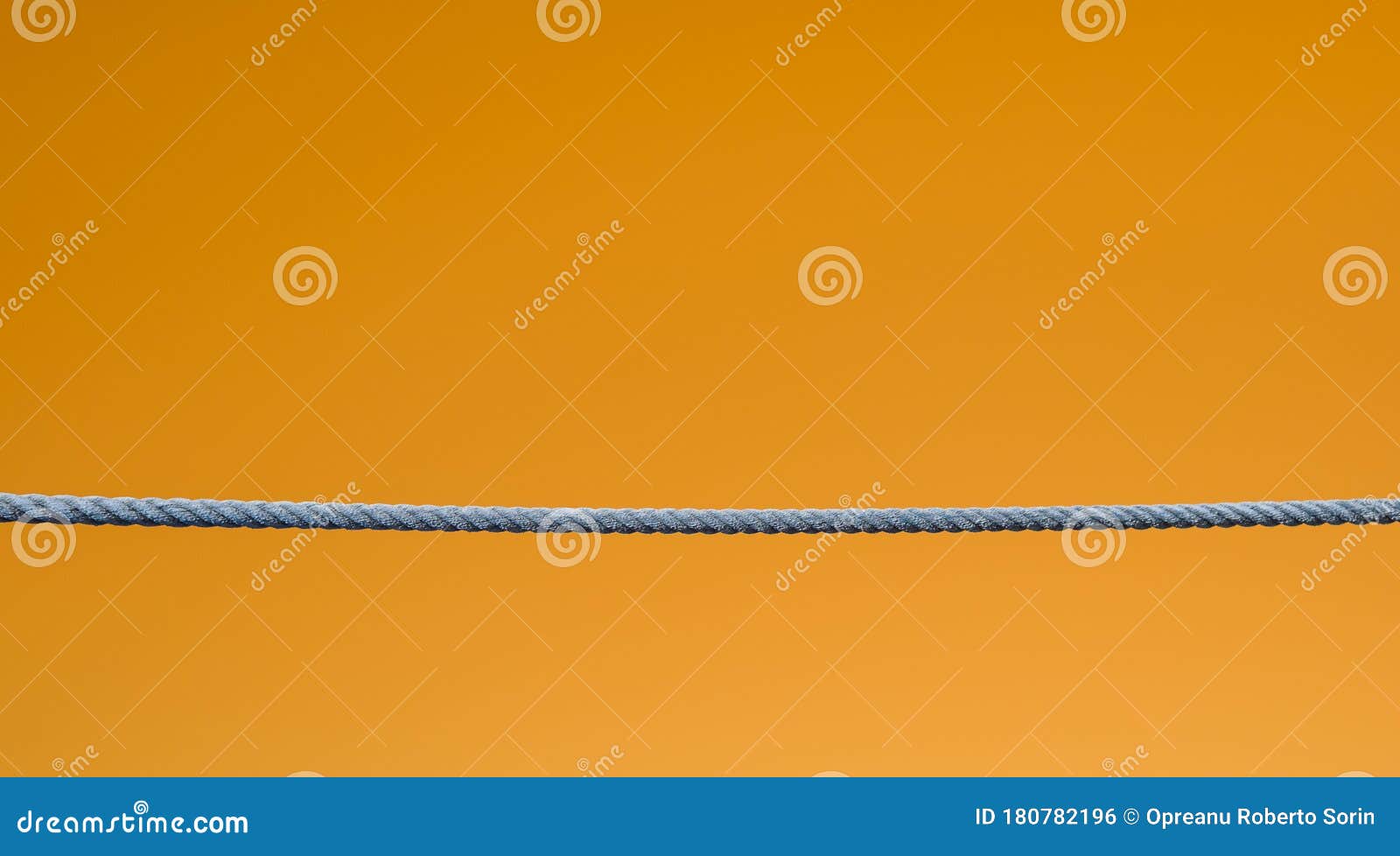 A Empty Rope Stretched on a Orange Background Stock Photo - Image of ...