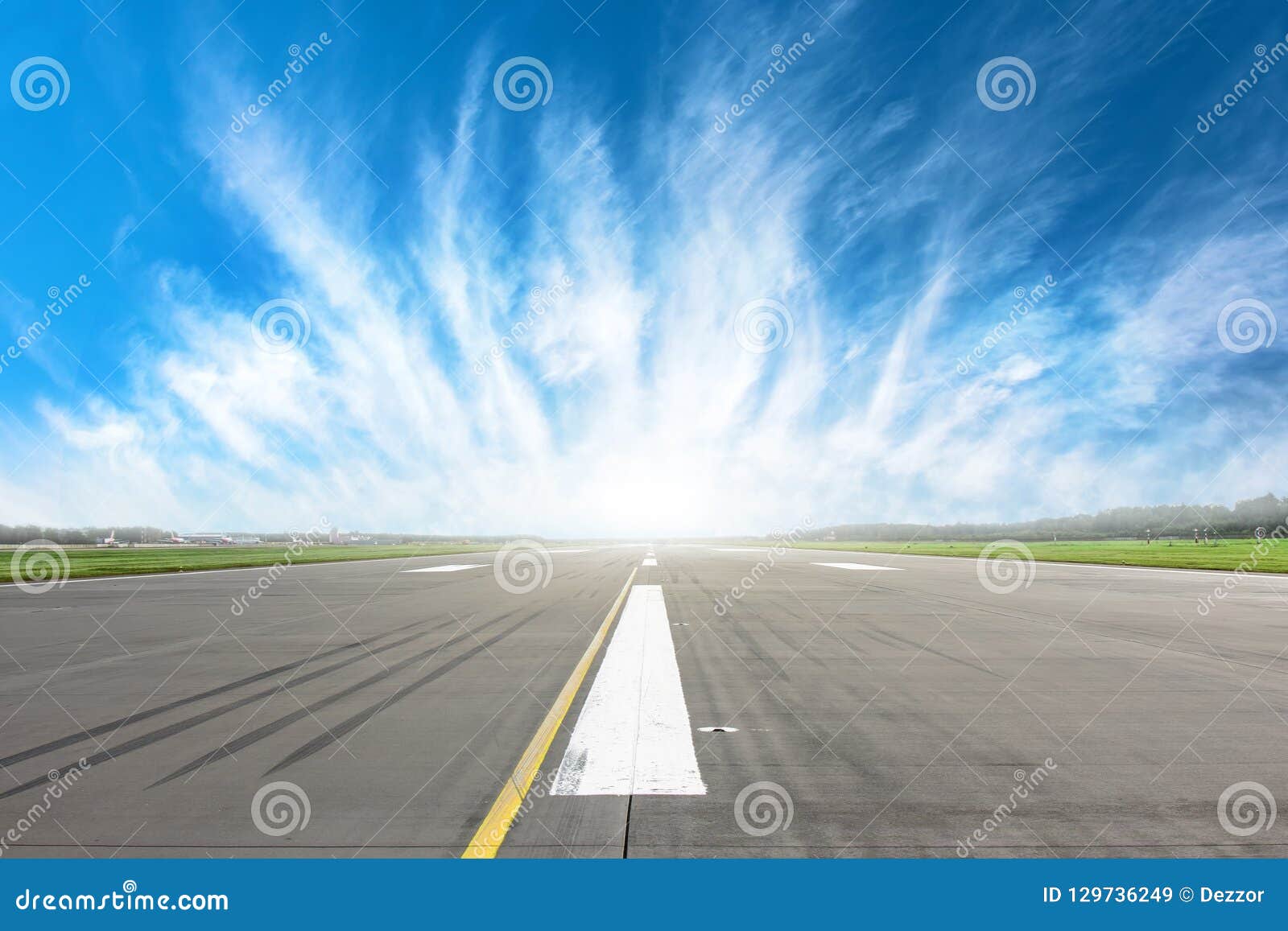Empty Runway Strip with Markings with Beautiful Clouds on the Horizon ...