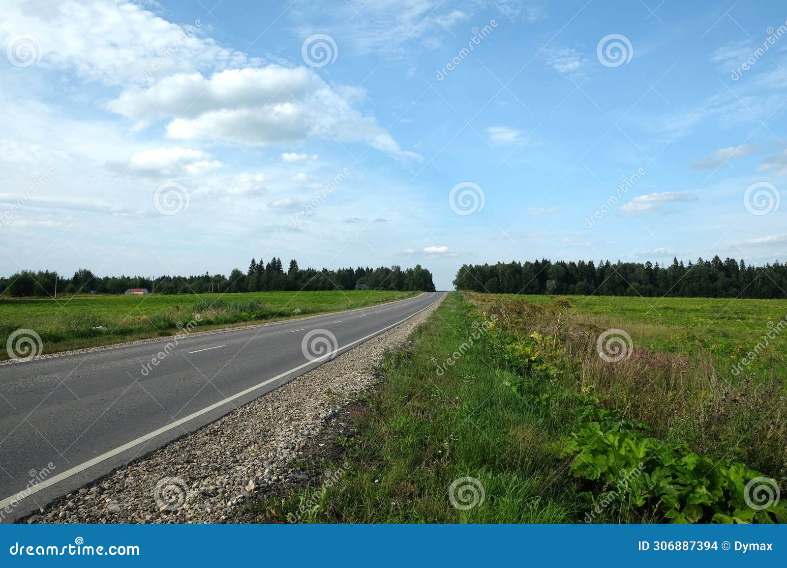Empty Rural Asphalt Road with Road Markings through the Fields To the ...