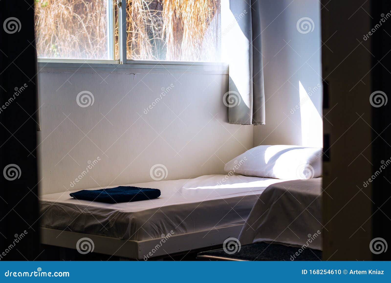 Empty Rustic Room of Cheap Hotel Apartments with Bed White Sheet and ...