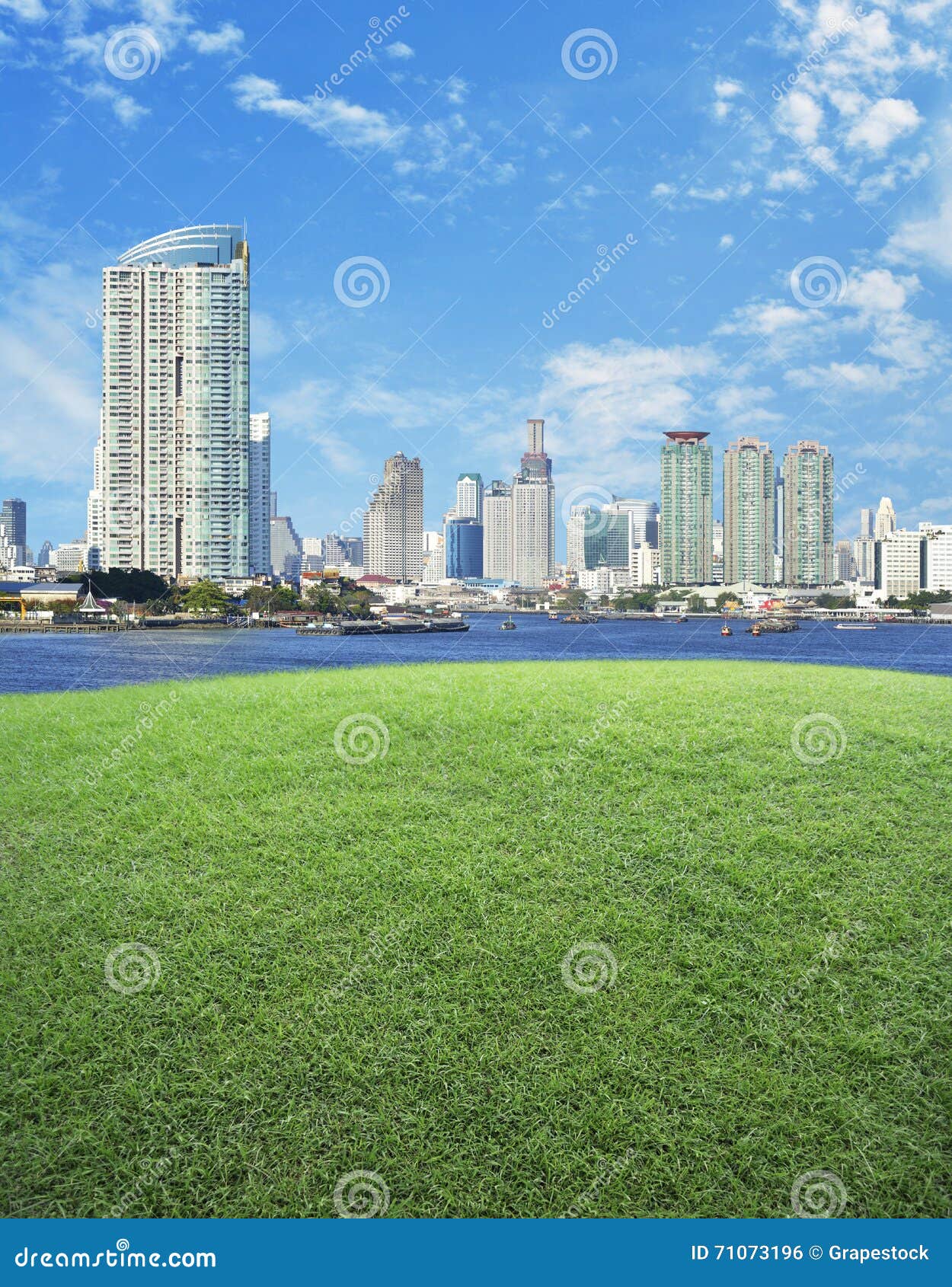 Empty Scene of Green Grass Field with City Tower and Blue Sky Ba Stock ...