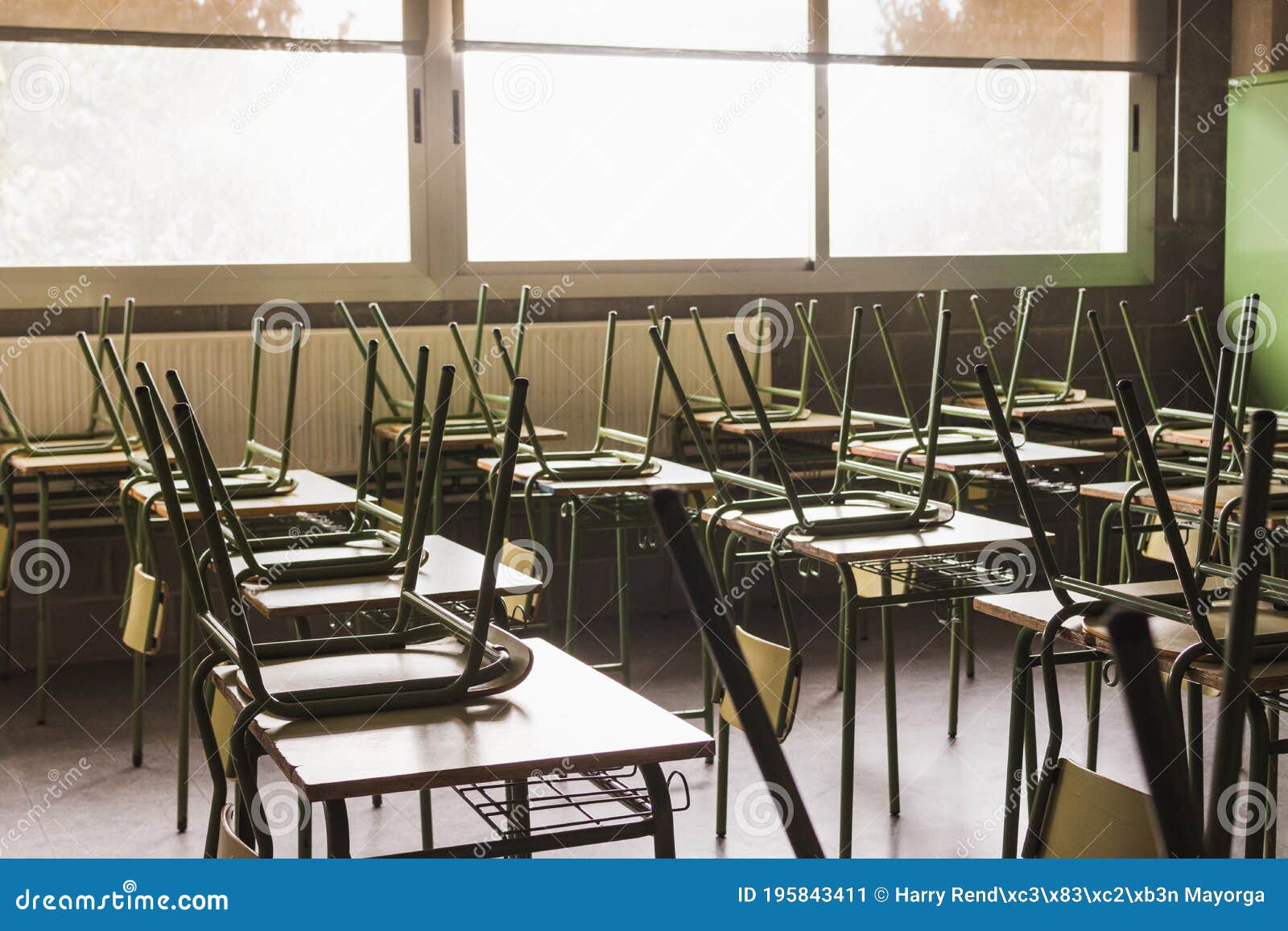 Empty School Corridor With Tall Windows Allowing Natural Light, And ...