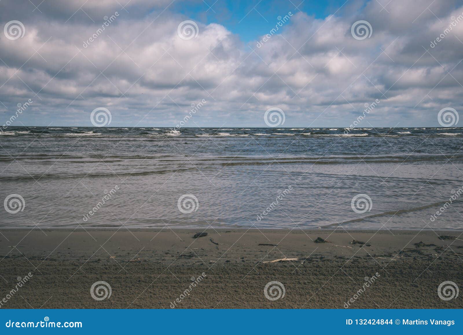 Empty Sea Beach in Spring with Some Birds and Cargo Ships on the Stock ...
