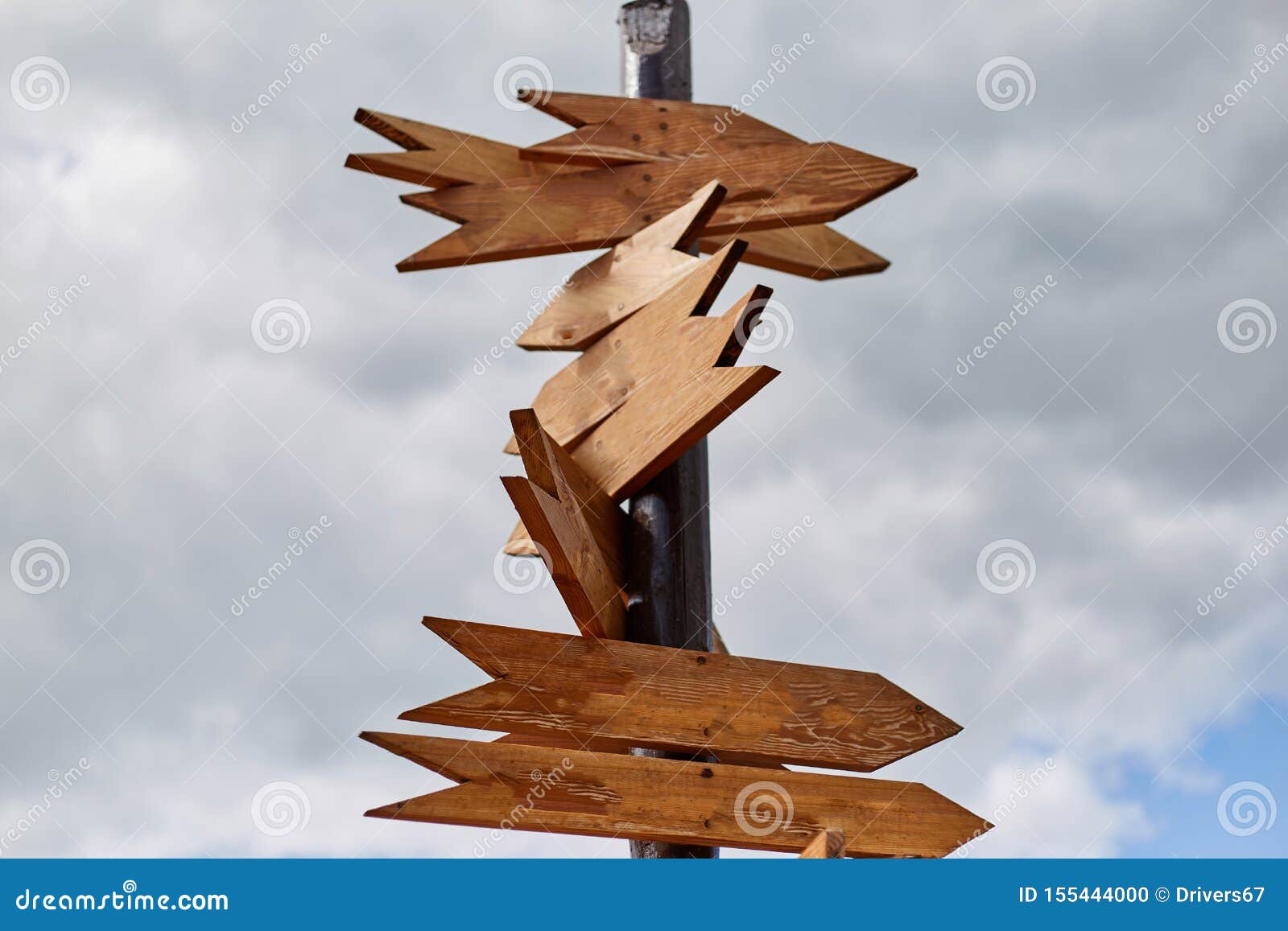 Empty Sign Pointers with a Space for Text. Wooden Pointers on a Wooden ...