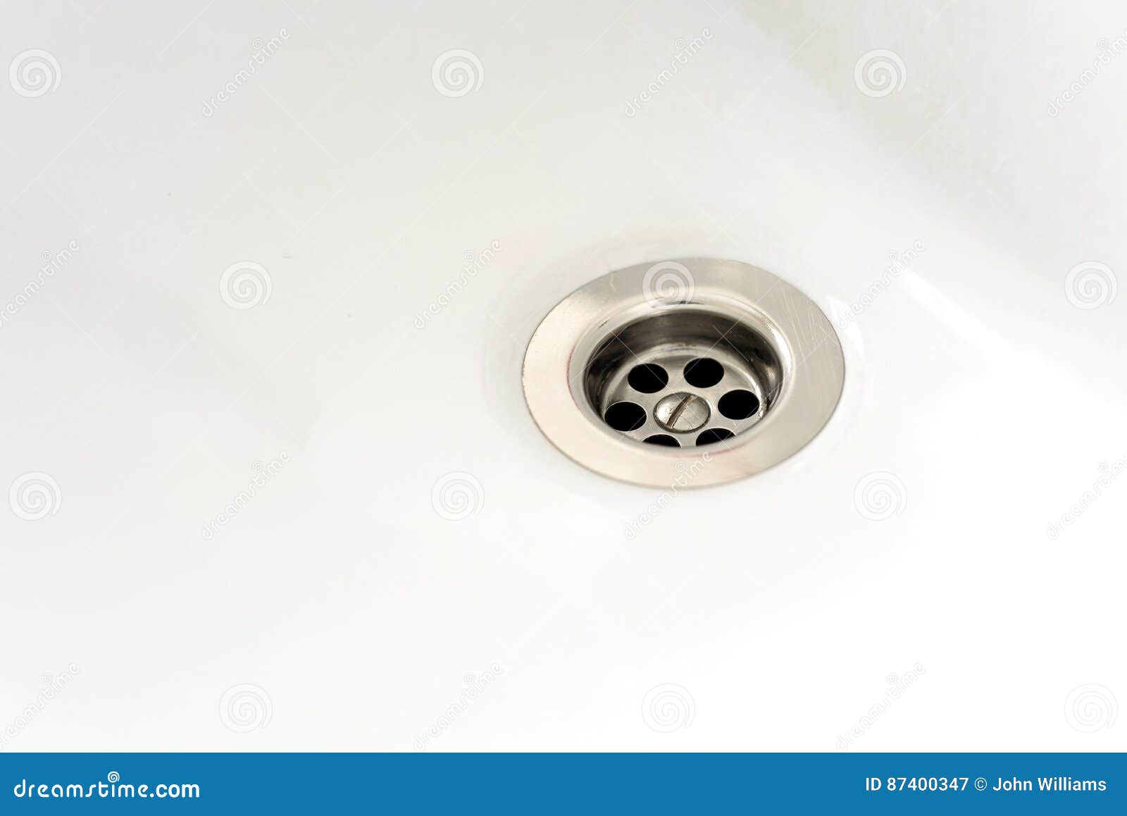 Empty Silver Sink Plughole and White Ceramic Basin Stock Image - Image ...