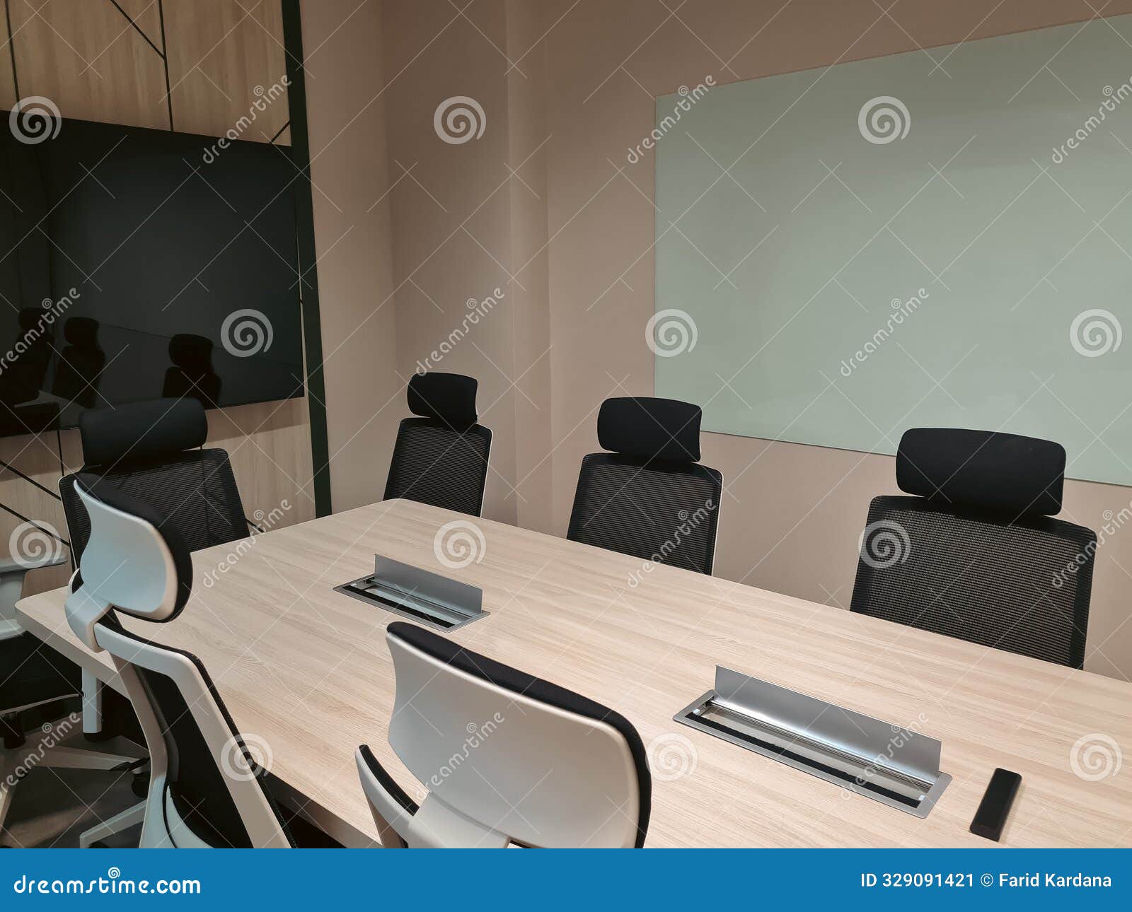 Empty Small Meeting Room with Television and White Board for Discussion ...