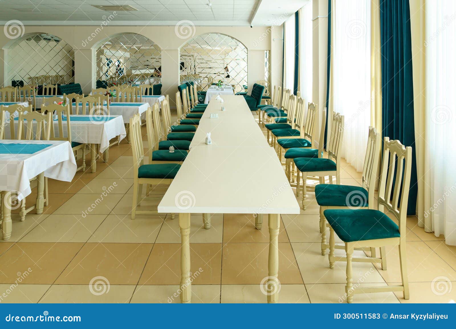 An Empty Spacious Banquet Hall with Tables and Chairs and Panoramic ...
