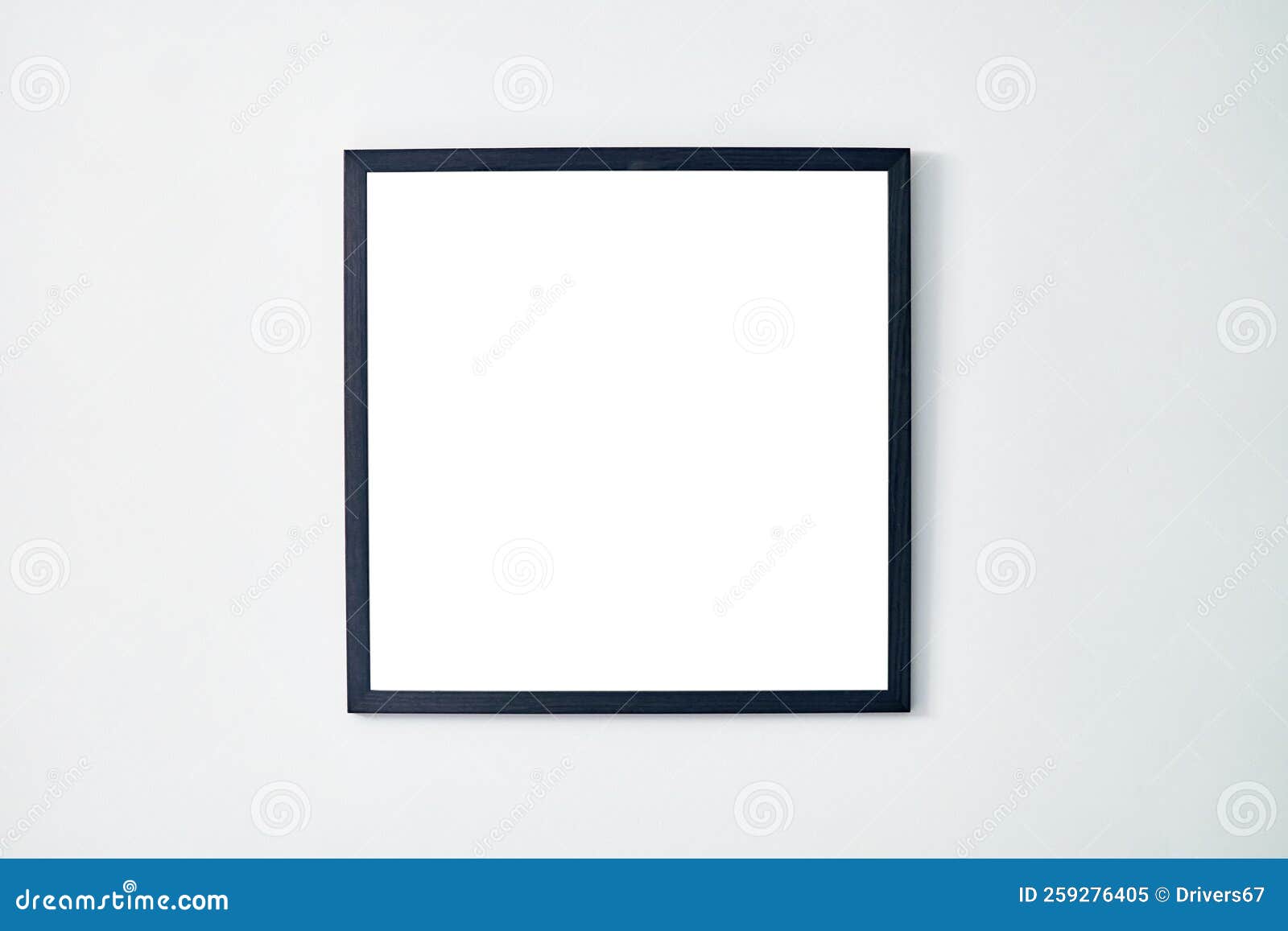 An Empty Square Photo Frame with a Black Border Hanging on a White Wall ...