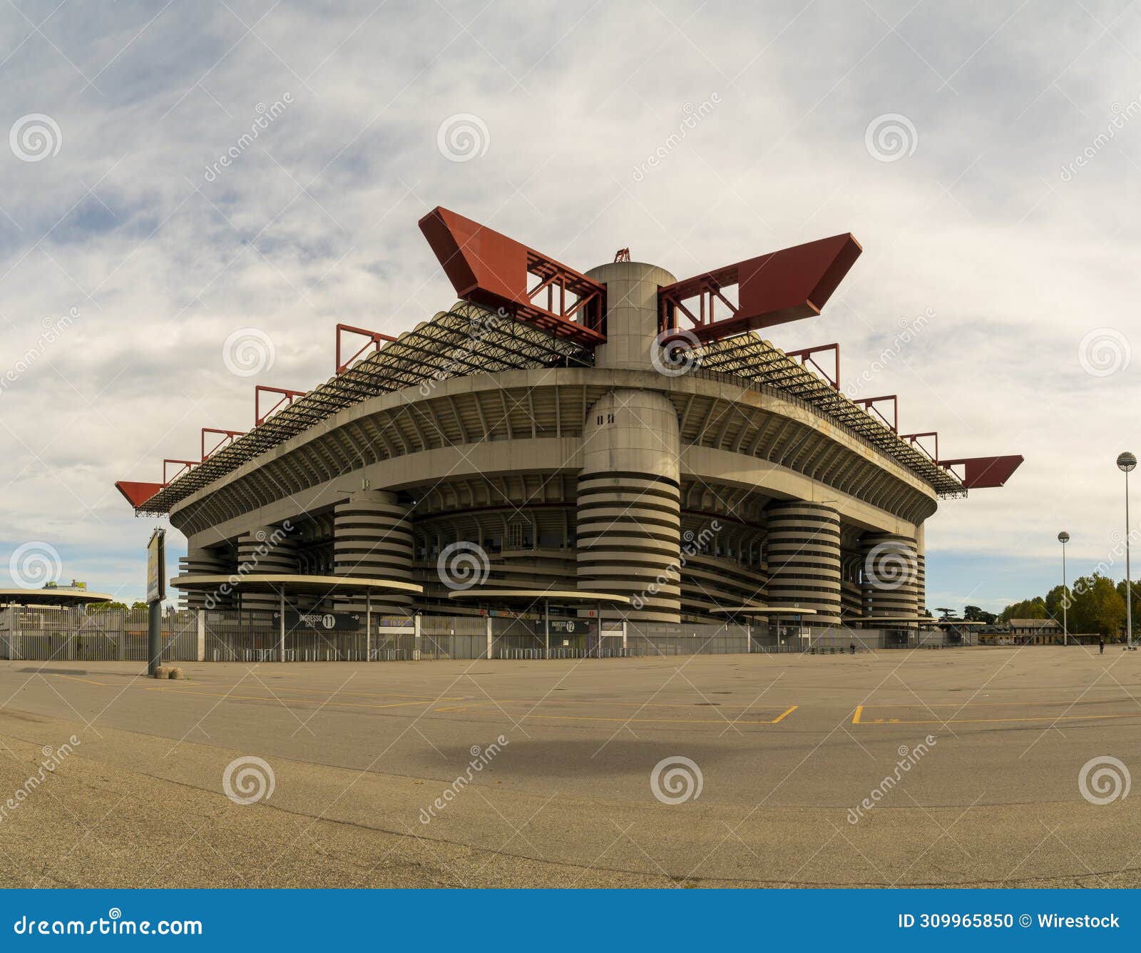 Empty Stadium Featuring a Curved Metal Structure with Vibrant Red Beams ...