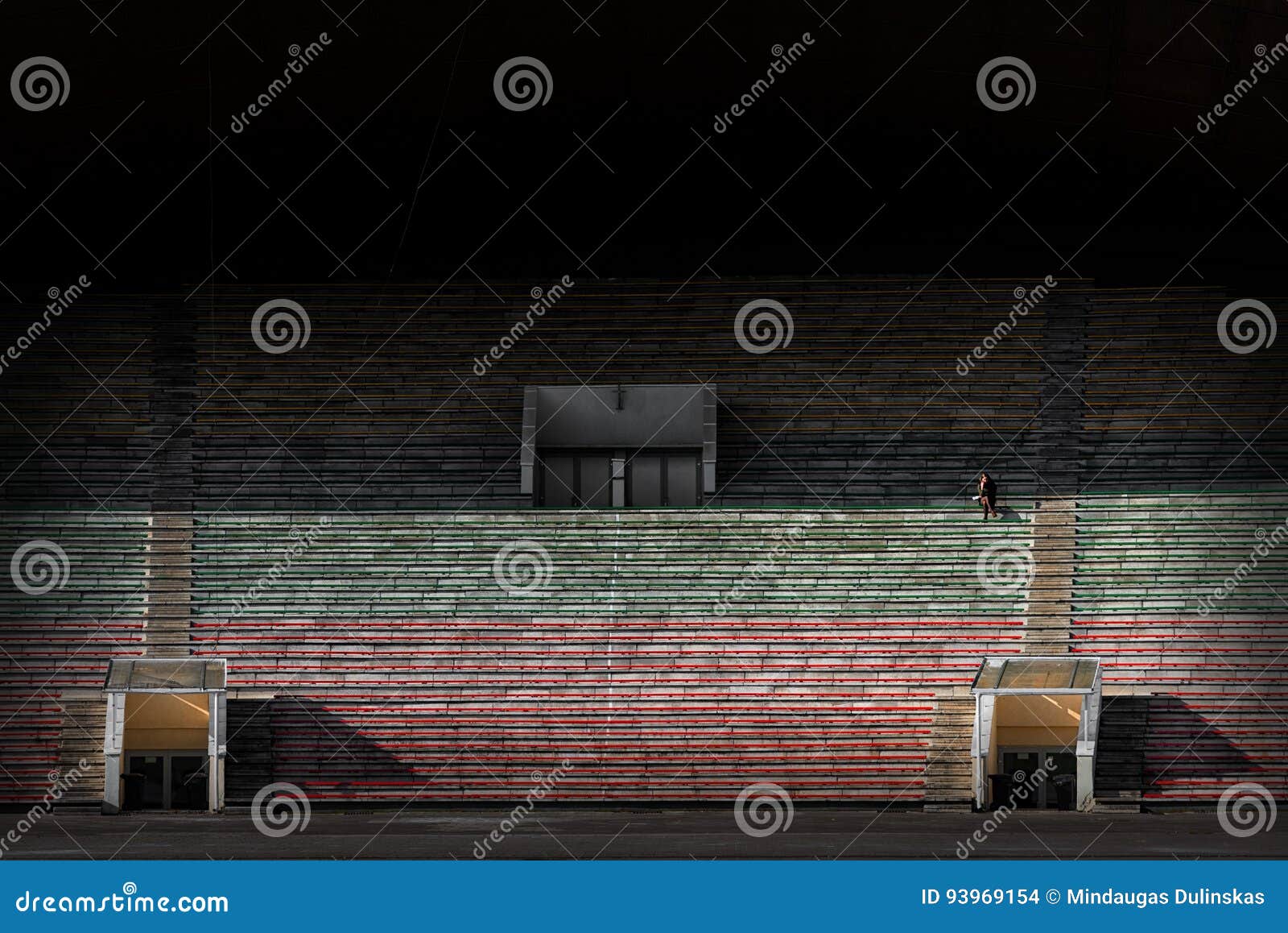 Empty Stadium in Lithuania, Vilnius. only One People Sitting in ...