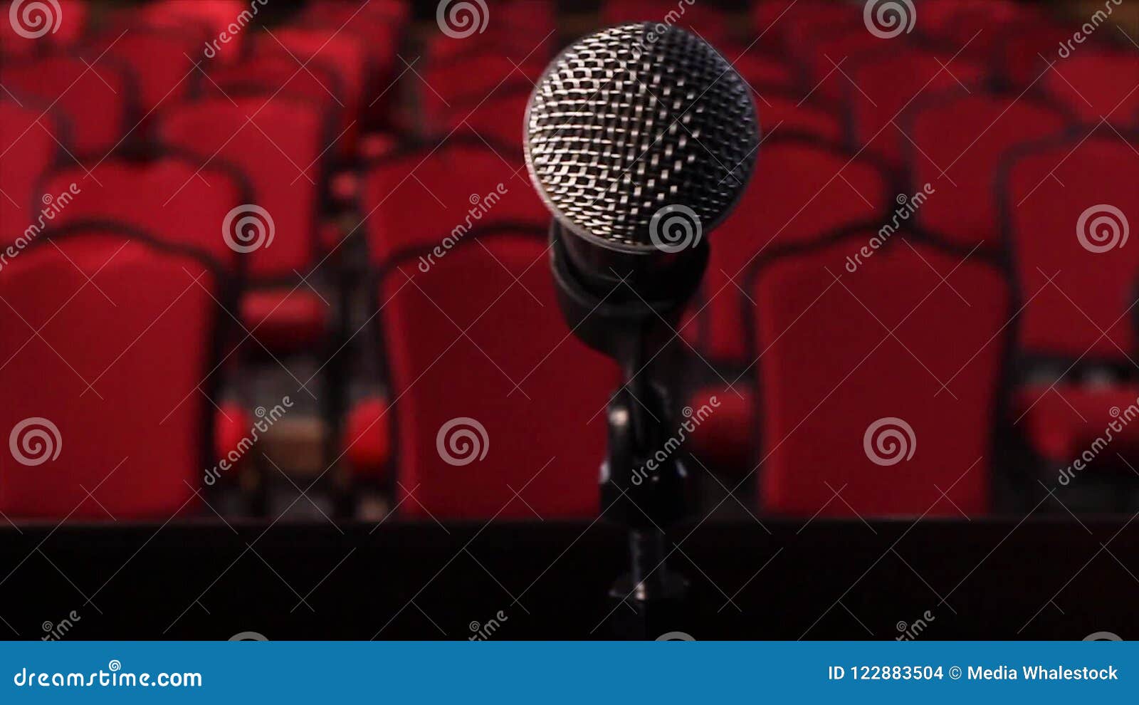 On an Empty Stage Microphone in Front of an Empty Hall. Scene Stock ...