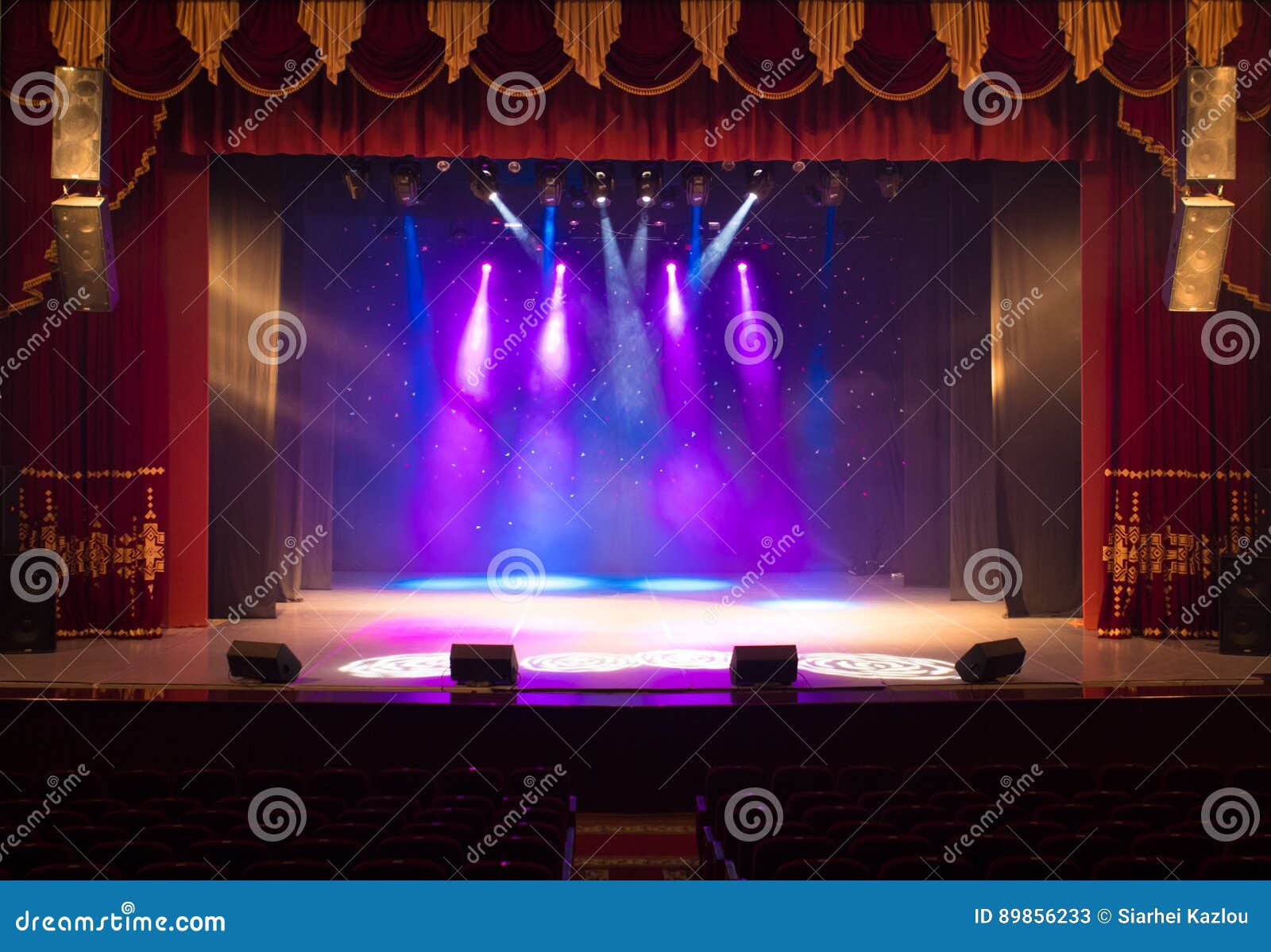 An Empty Stage of the Theater, Lit by Spotlights and Smoke Stock Image ...