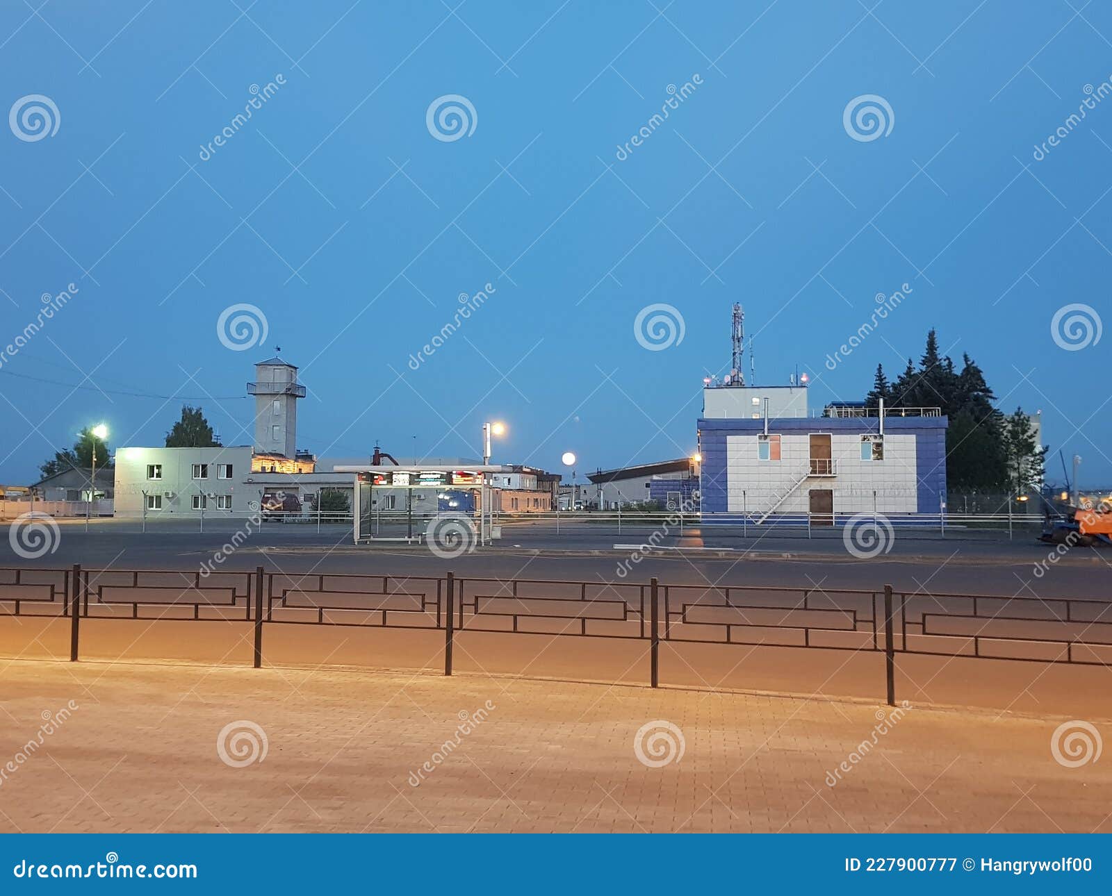 An empty stop at dusk stock image. Image of skyline - 227900777