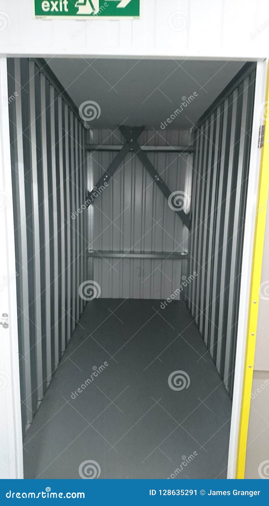 An empty self storage unit stock image. Image of removals - 128635291