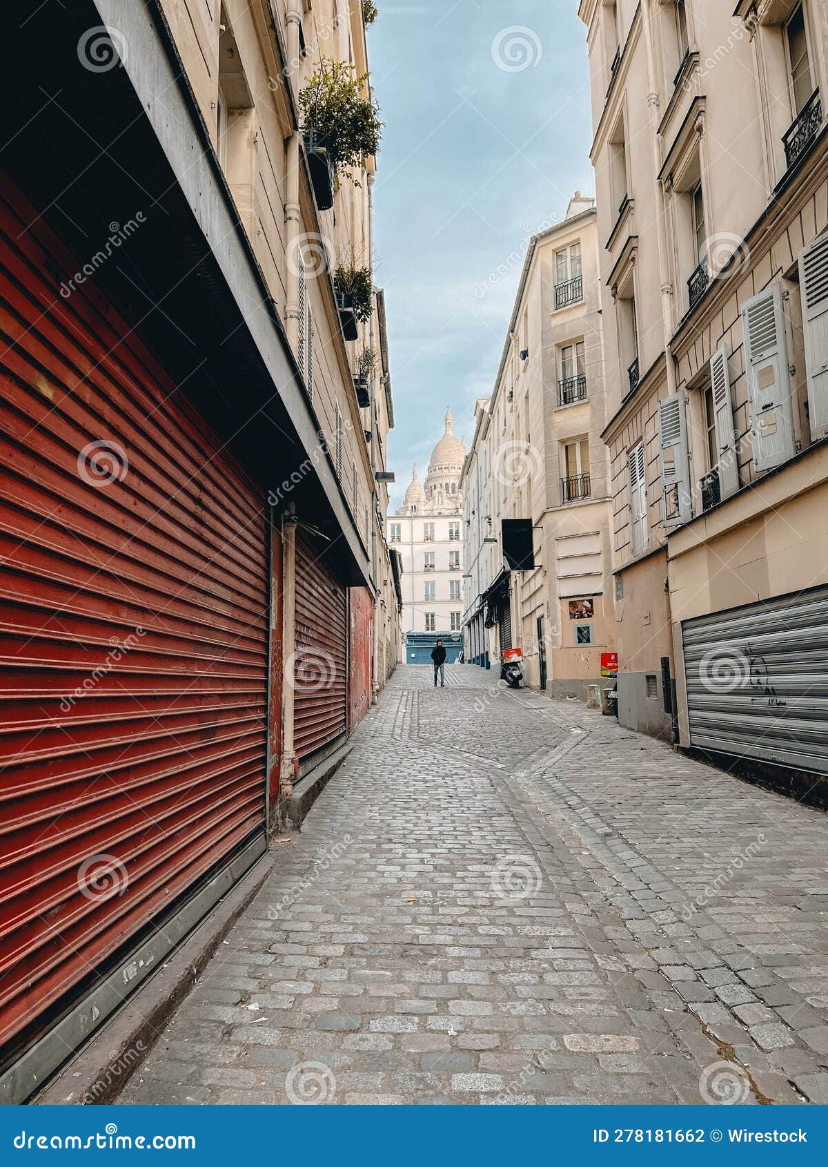 Empty Street with Closed Shutters on the Buildings Lining the Roadway ...