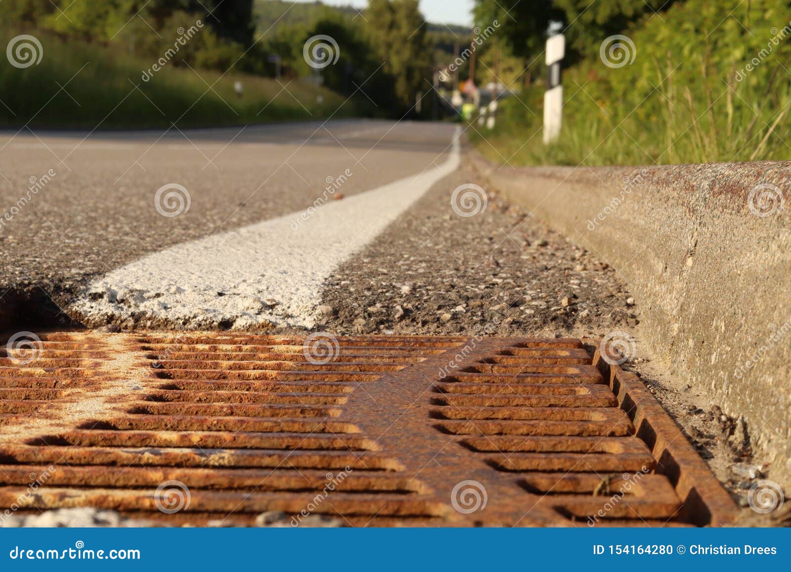 Empty Street with a Gully in the Front Stock Photo - Image of ...