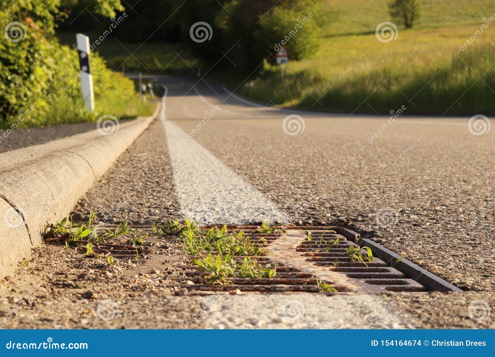Empty Street with a Gully in the Front Stock Photo - Image of leaving ...