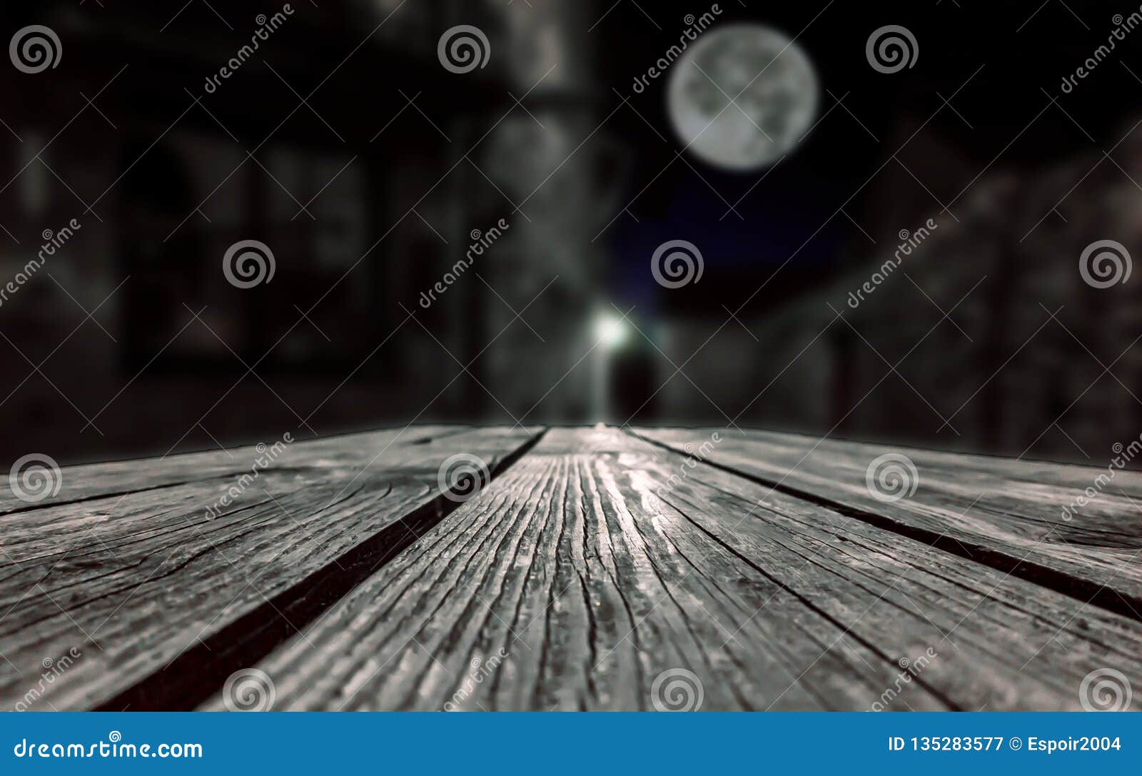 Empty Surface of a Wooden Table in a Village with a Mysterious Figure ...