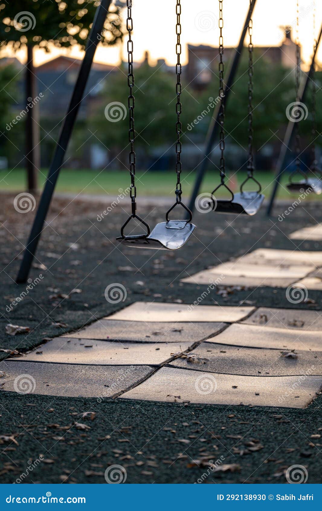 Empty Swing at a Playground at Sunset Stock Photo - Image of nature ...