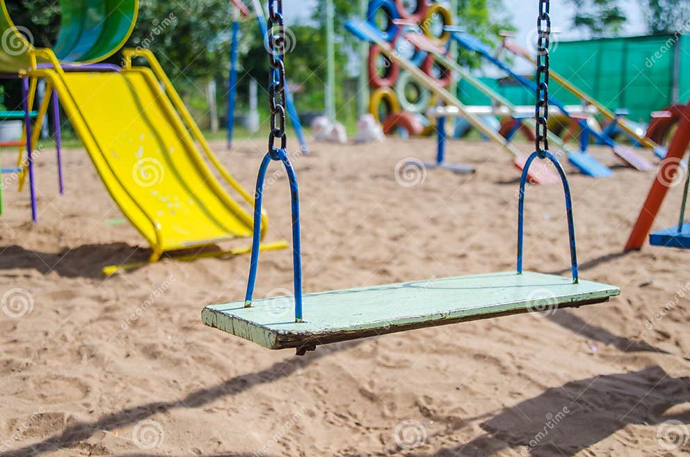 Empty swing set stock photo. Image of playful, young - 71725604