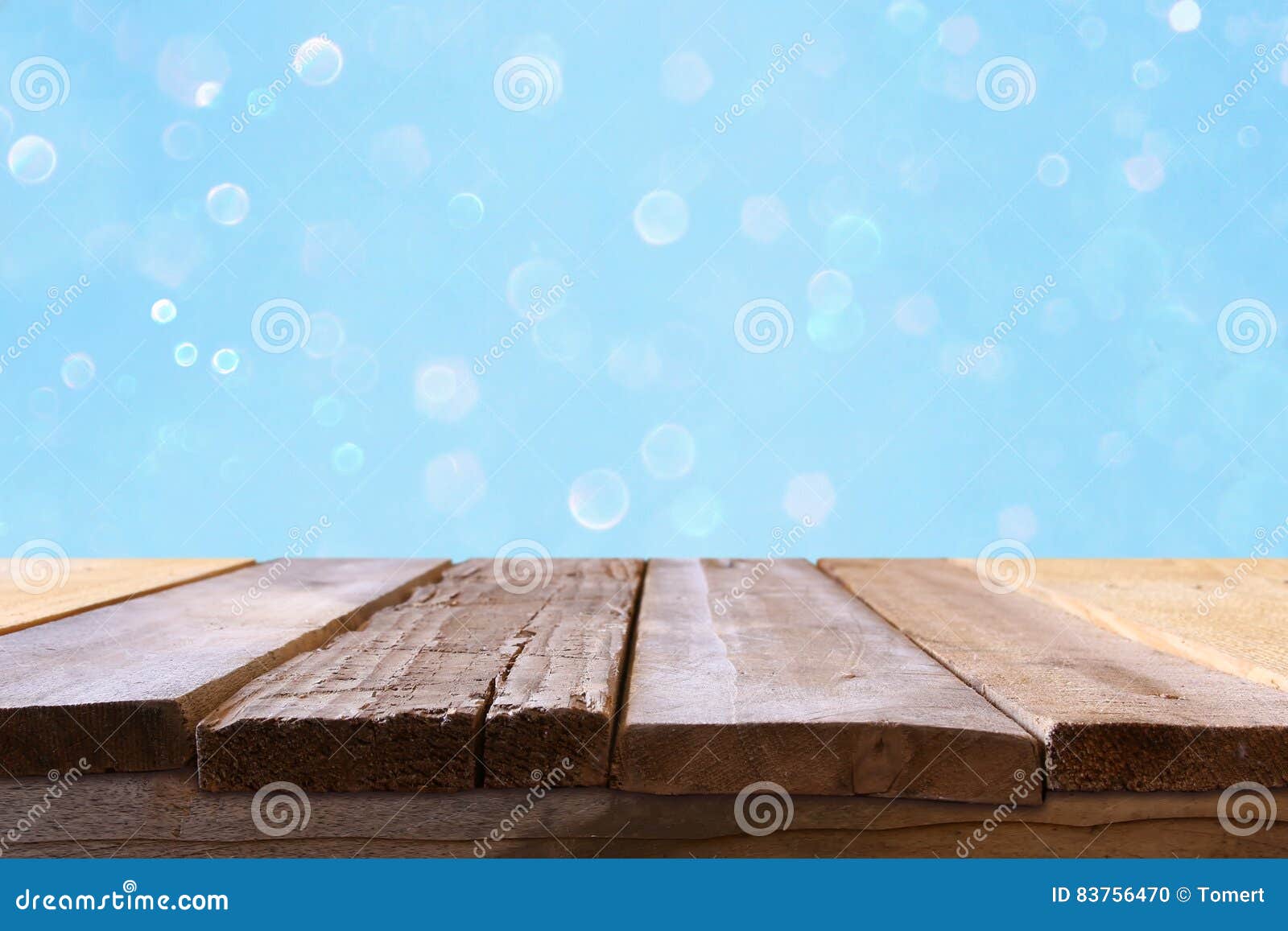 Empty Table in Front of Blue Glitter Lights Background Stock Photo ...