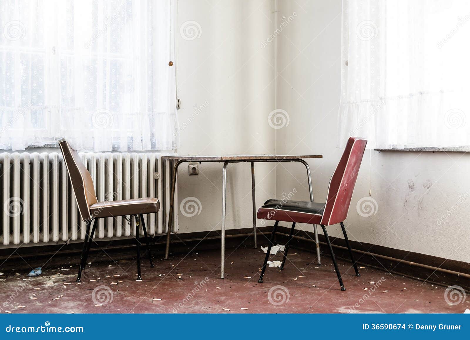 Empty Table and Two Chairs in a Messy Room Stock Photo - Image of ...
