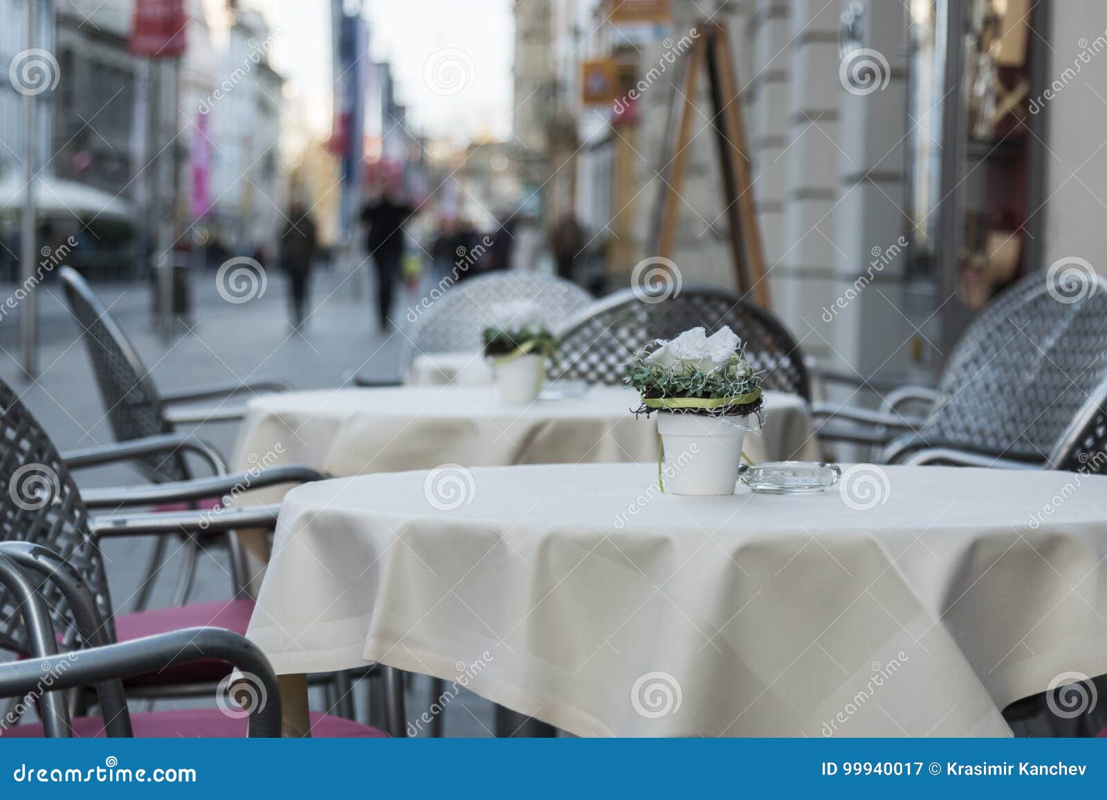 Empty tables on the street stock image. Image of tables - 99940017