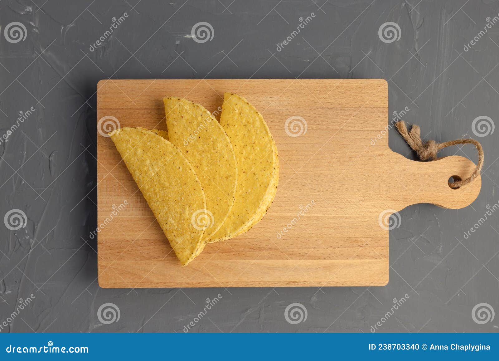 Empty Taco Shells on Board on Dark Background Stock Photo - Image of ...
