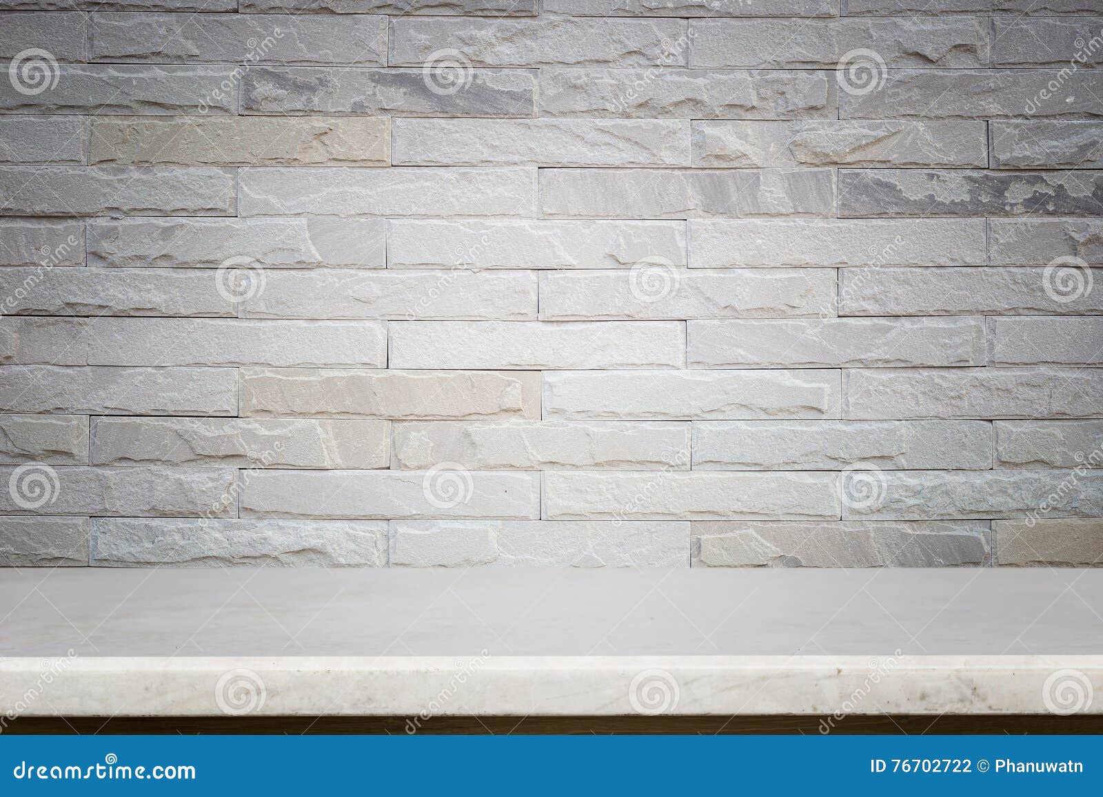 Empty Top of Natural Stone Table and Stone Wall Background Stock Photo ...