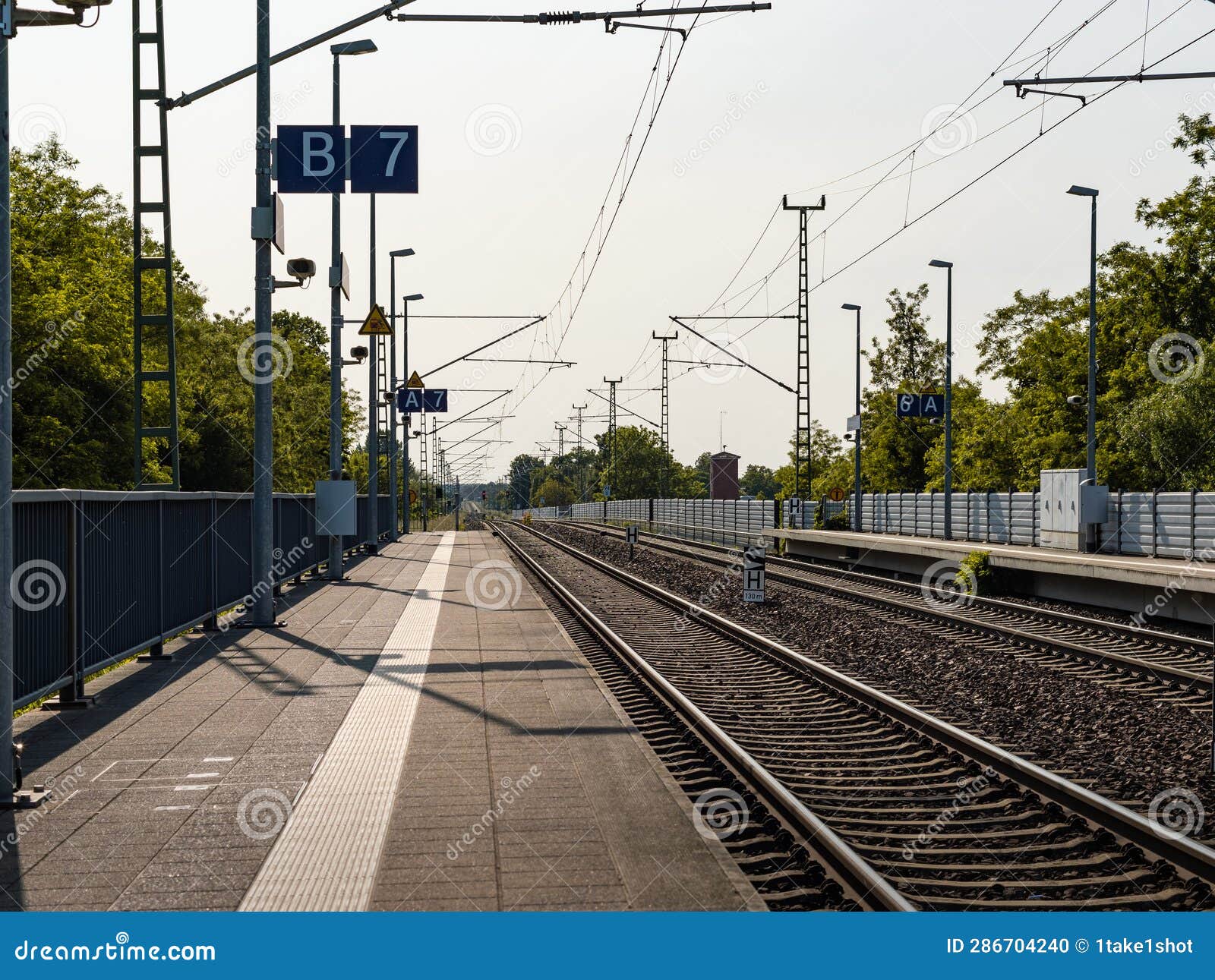 Empty Train Platform and Straight Railway Tracks Editorial Image ...
