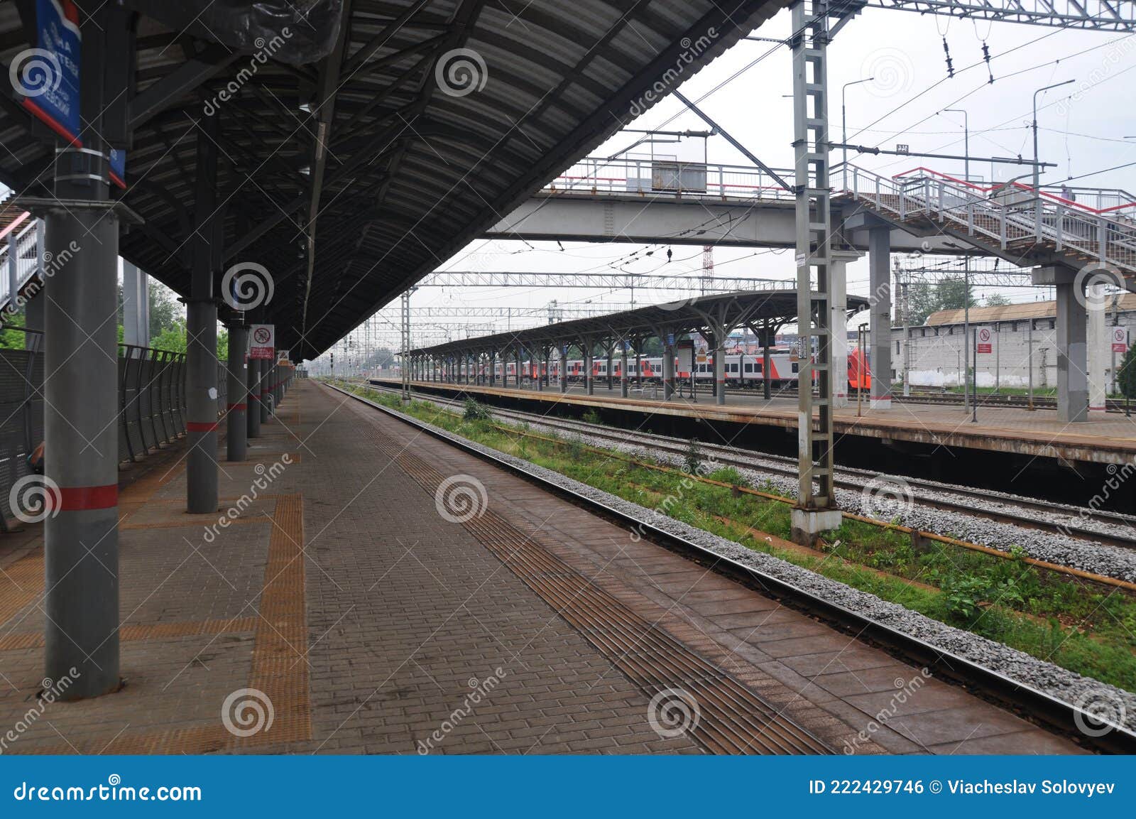 Empty Train Platforms And A Parked Locomotive Editorial Photo ...