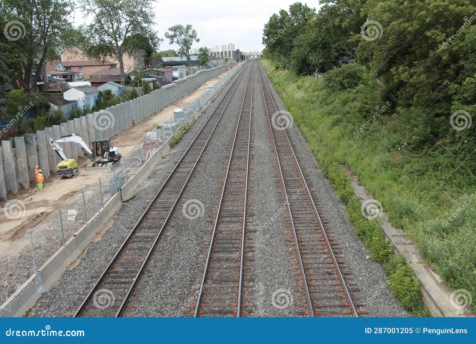 Empty Train Tracks with Construction Equipment To Left at Work ...
