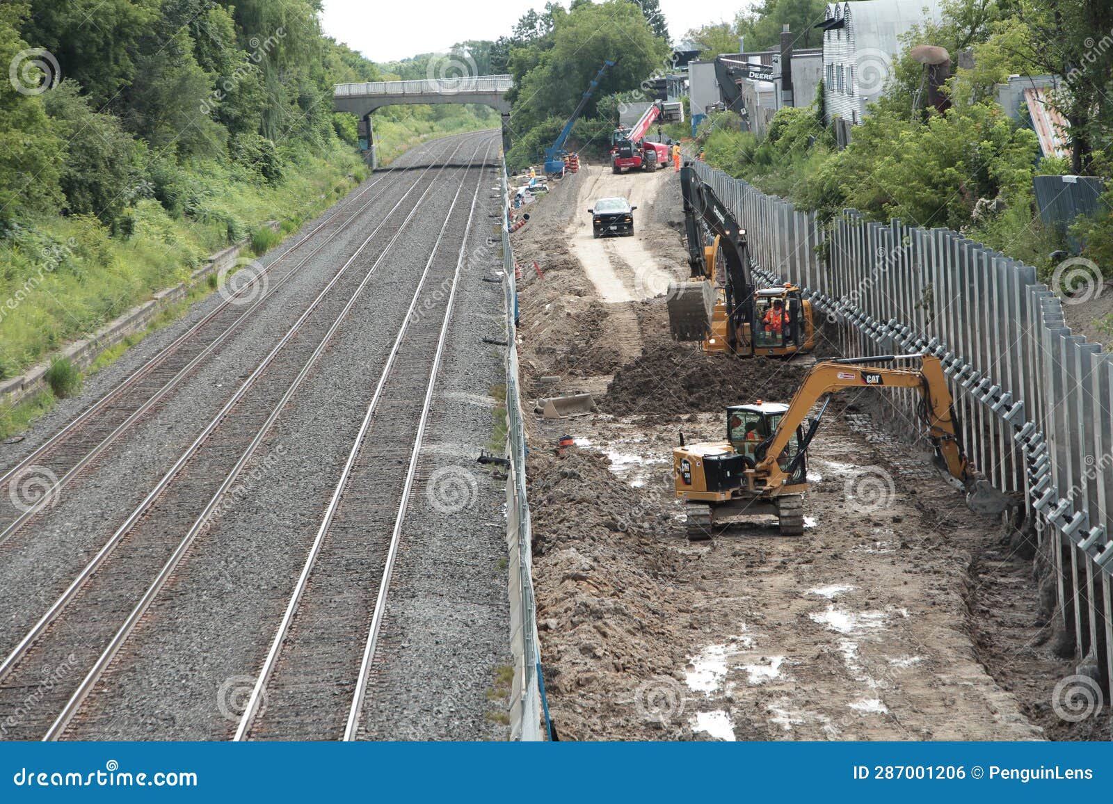 Empty Train Tracks with Construction Equipment To Right at Work ...