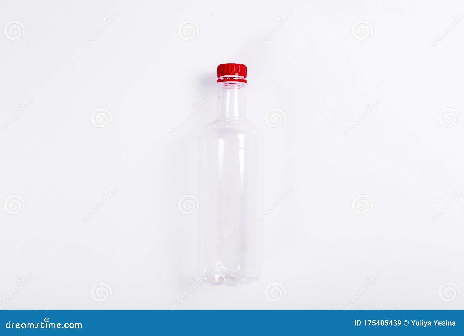 Empty Transparent Plastic Bottle with a Red Cap on a White Background ...