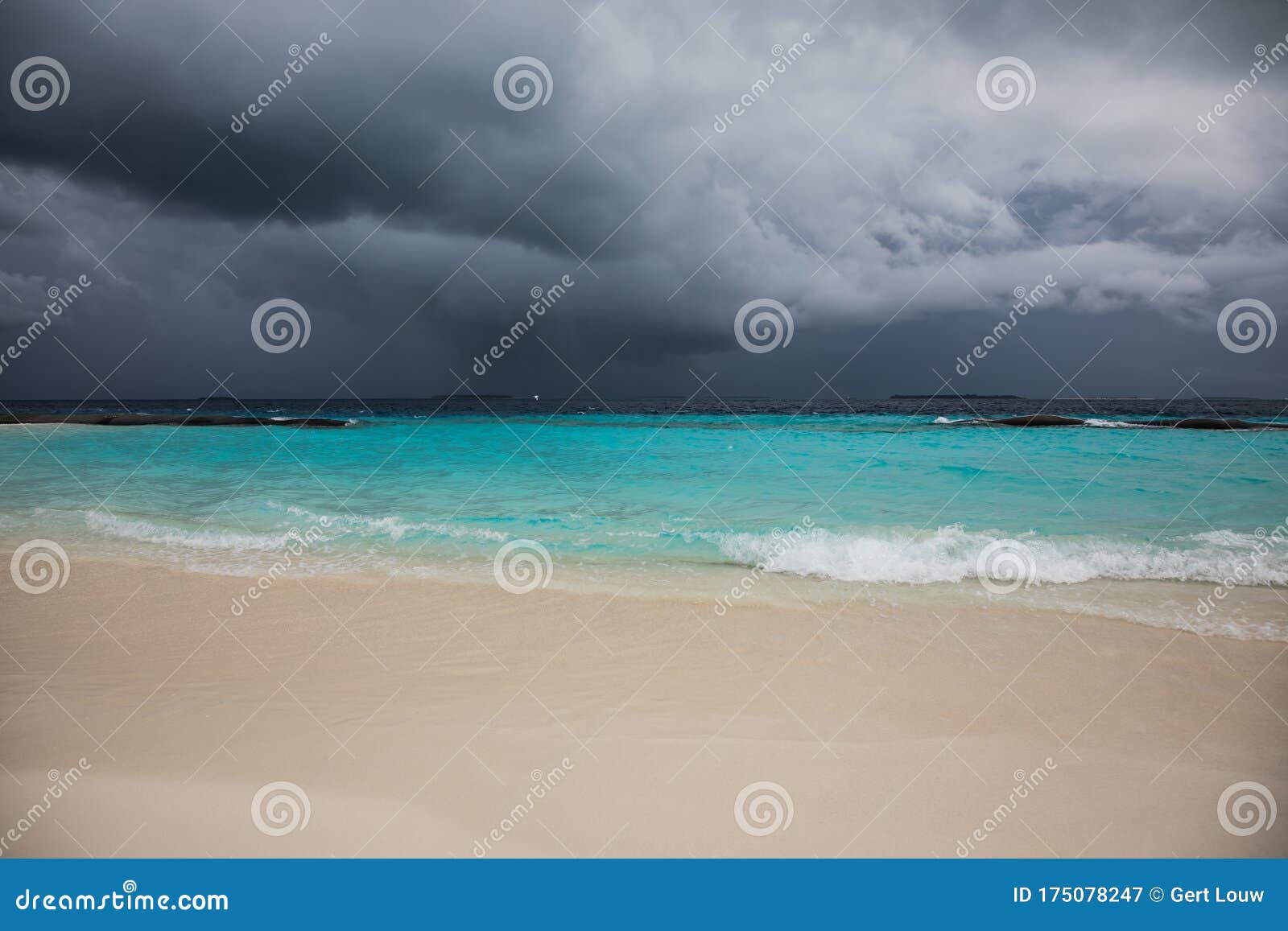 Empty Tropical Beach with Dark Stormy Clouds Approaching Stock Image ...