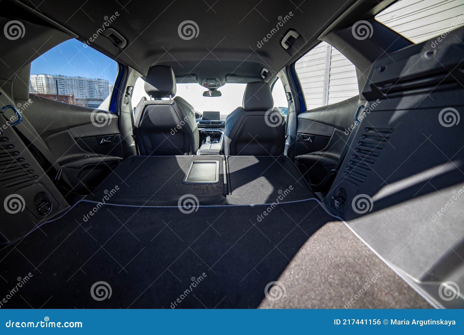 Empty Trunk of a Modern Car with Folded Rear Seats. Large Interior ...
