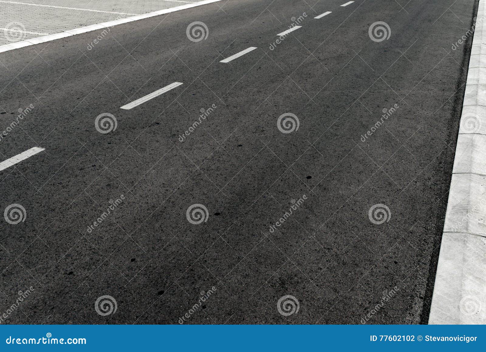 A Two-lane Asphalt Road Follows The Undulating Relief, The Surface ...