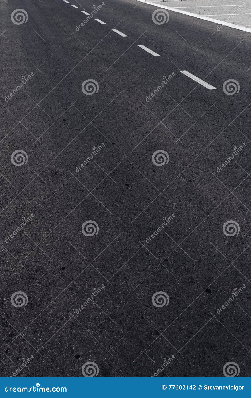 A Two-lane Asphalt Road Follows The Undulating Relief, The Surface ...