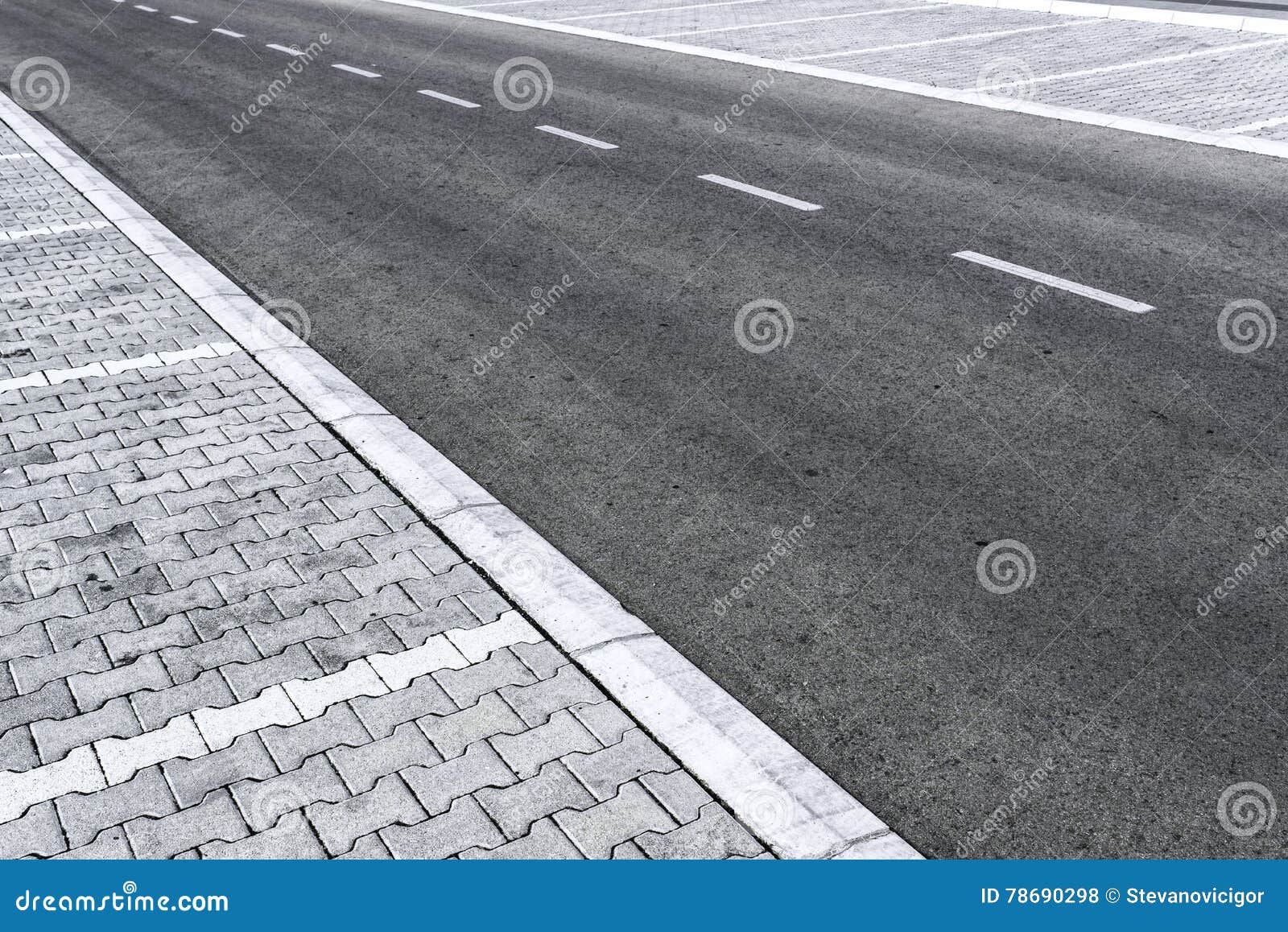 A Two-lane Asphalt Road Follows The Undulating Relief, The Surface ...
