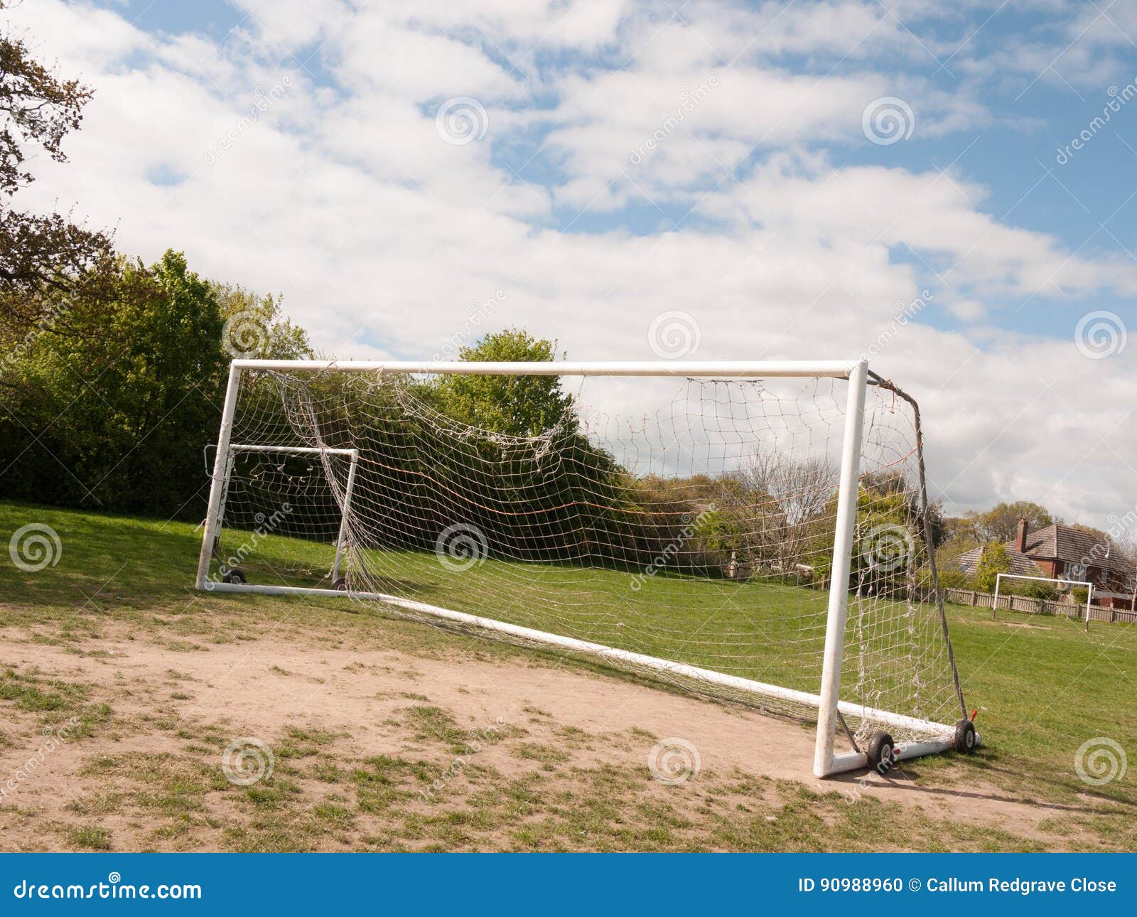 An Empty and Unused Goal Post with a White Net in the Middle of Stock ...