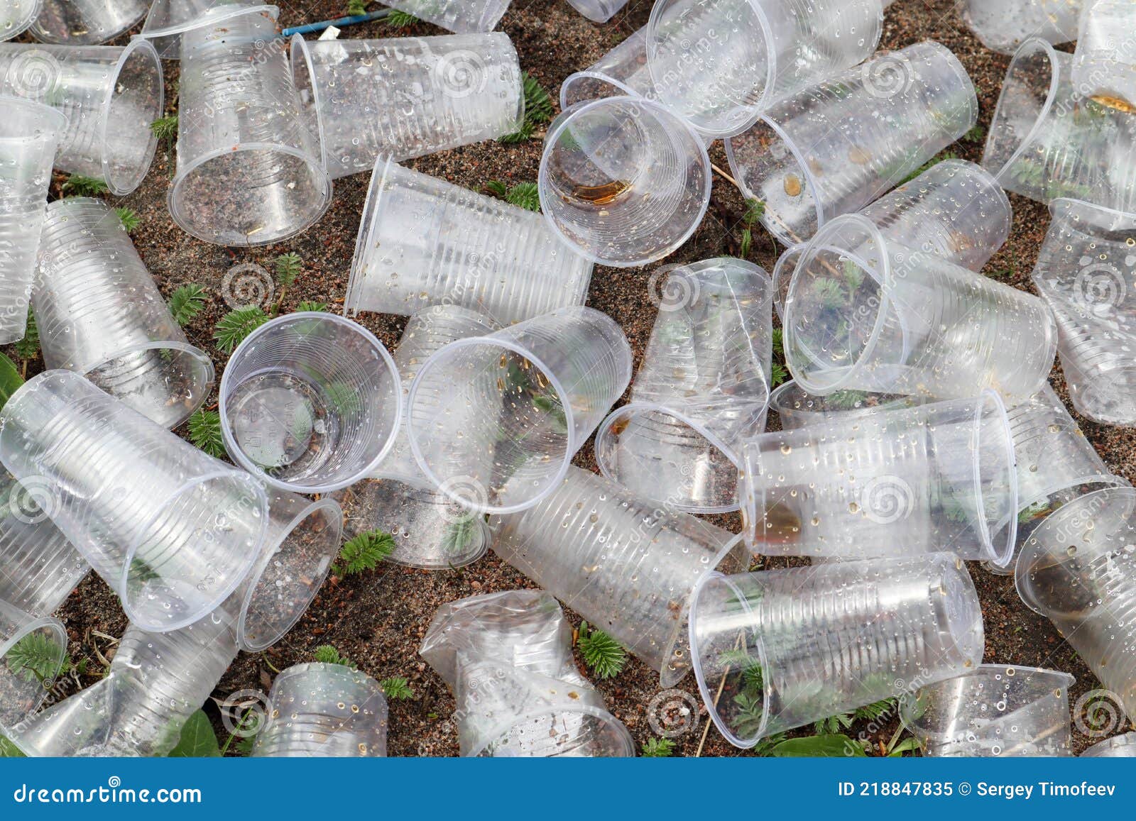Empty Used Plastic Cups on the Ground Closeup - Environment Pollution ...
