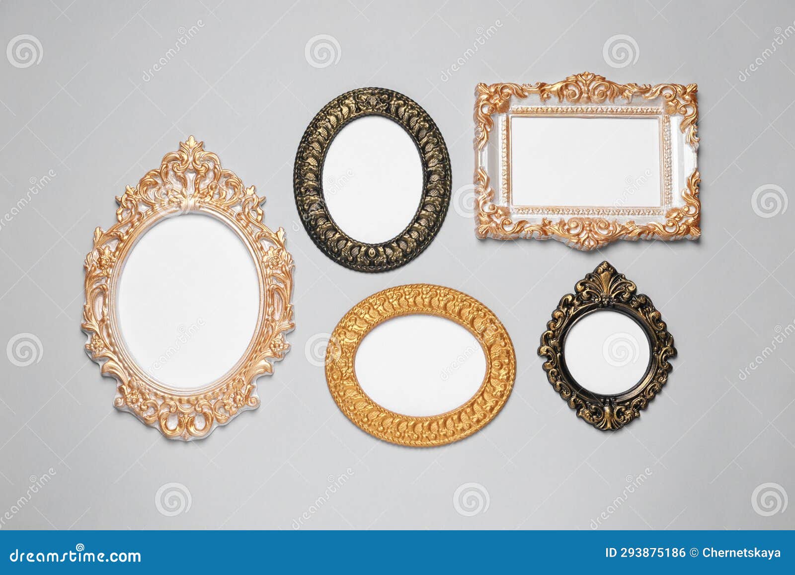 Empty Vintage Frames Hanging on Light Gray Wall Stock Photo - Image of ...