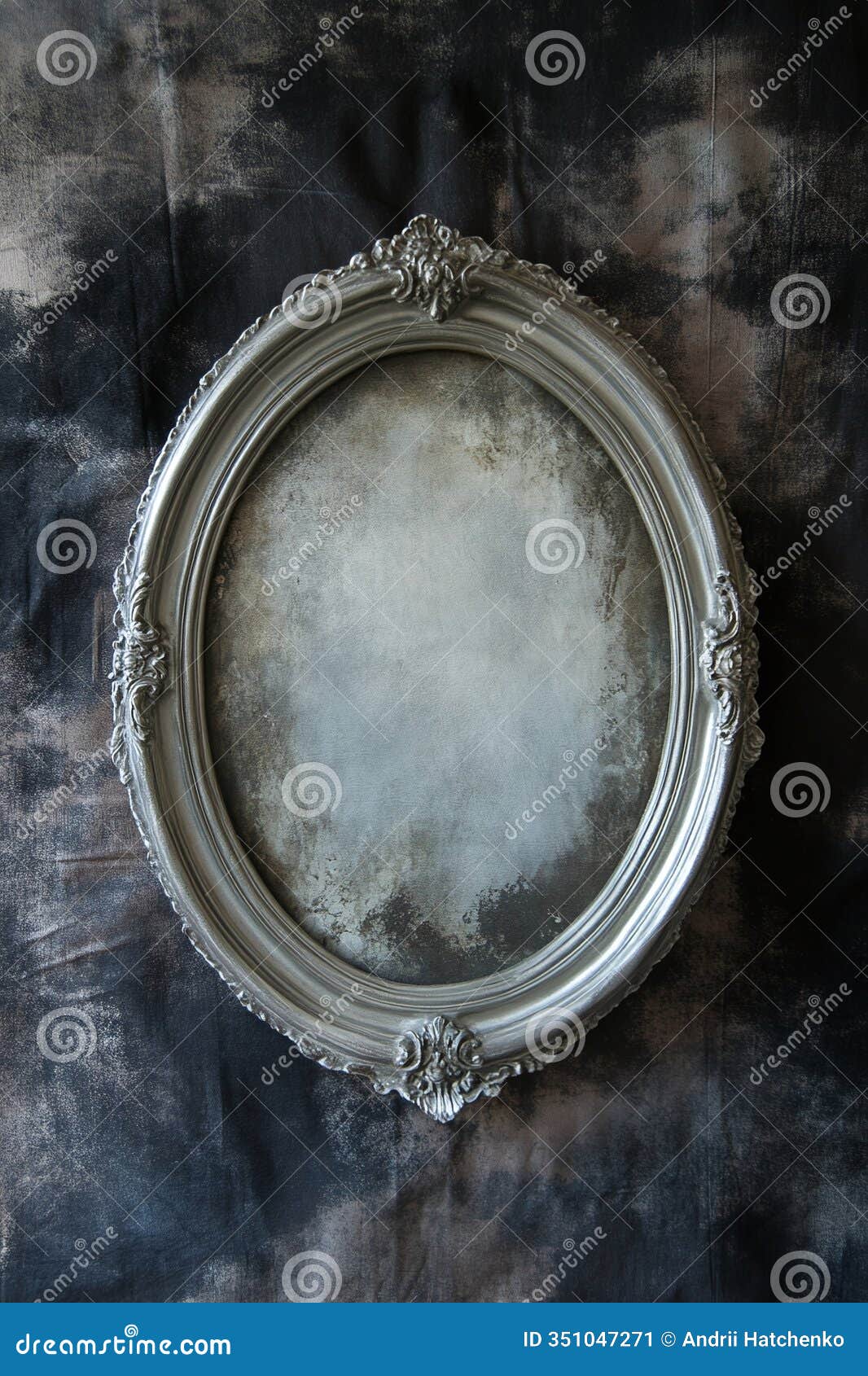 An Empty Vintage Oval Frame with a Distressed Silver Finish Set Against ...