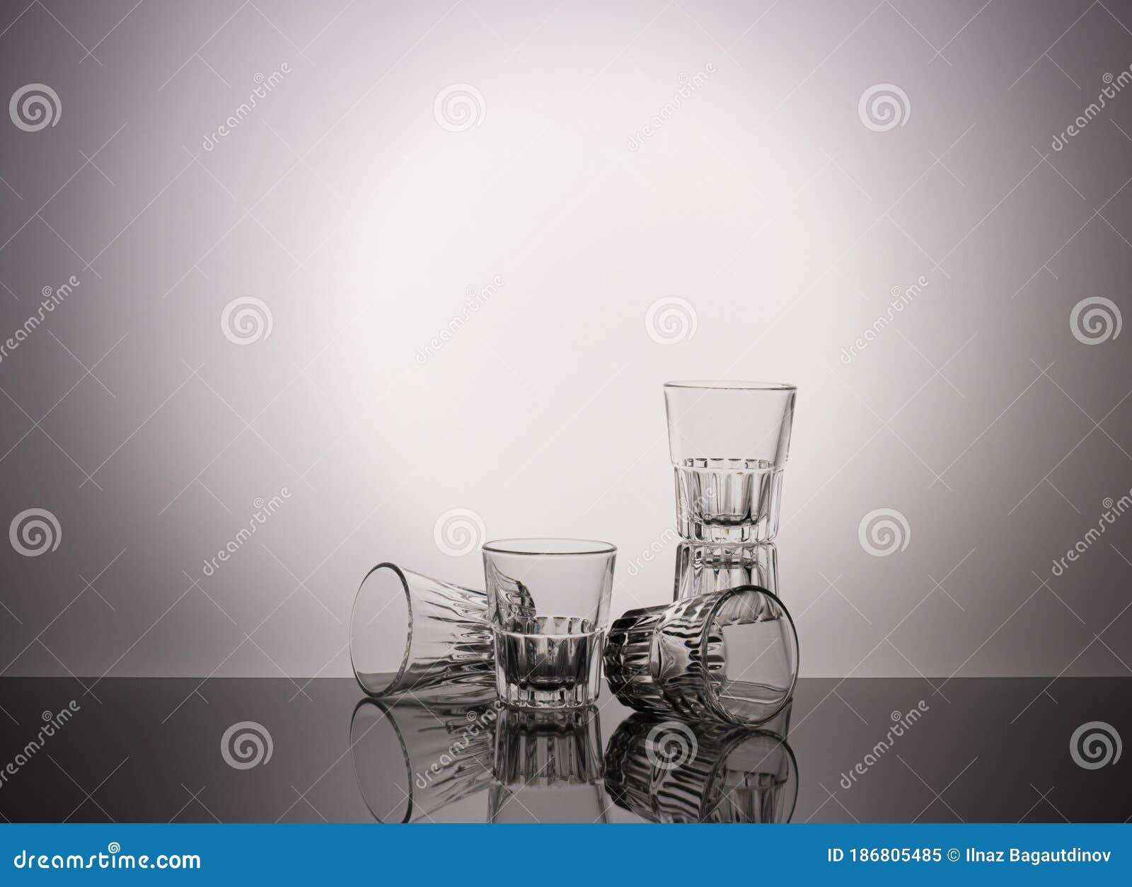 Empty Vodka Glasses are Built Like a Skyscraper with a Beautiful ...