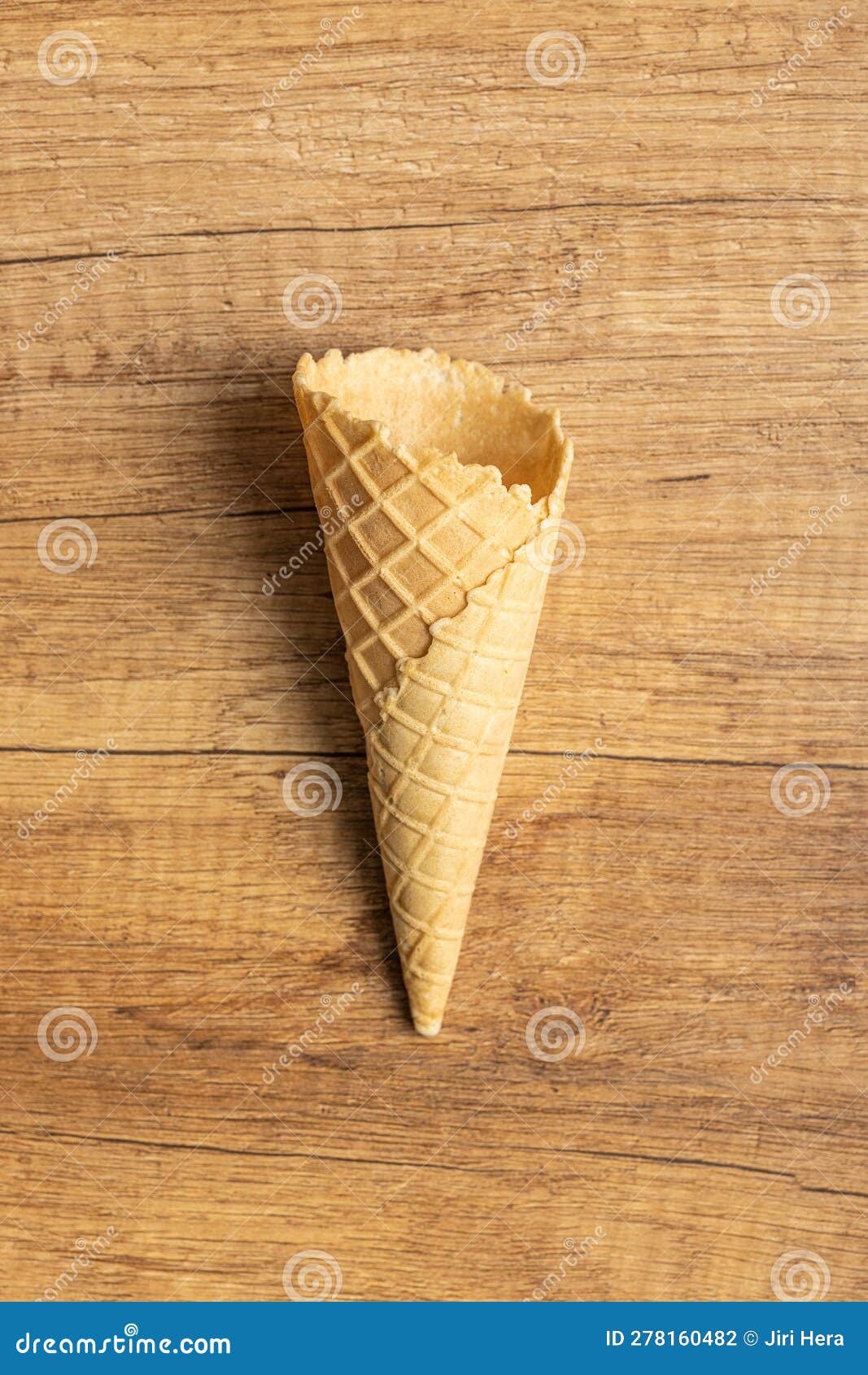 Empty Wafer Cone. Sweet Ice Cream Cornet on Wooden Table. Top View ... Empty Wafer Cone. Sweet Ice Cream Cornet on Wooden Table. Top View ...