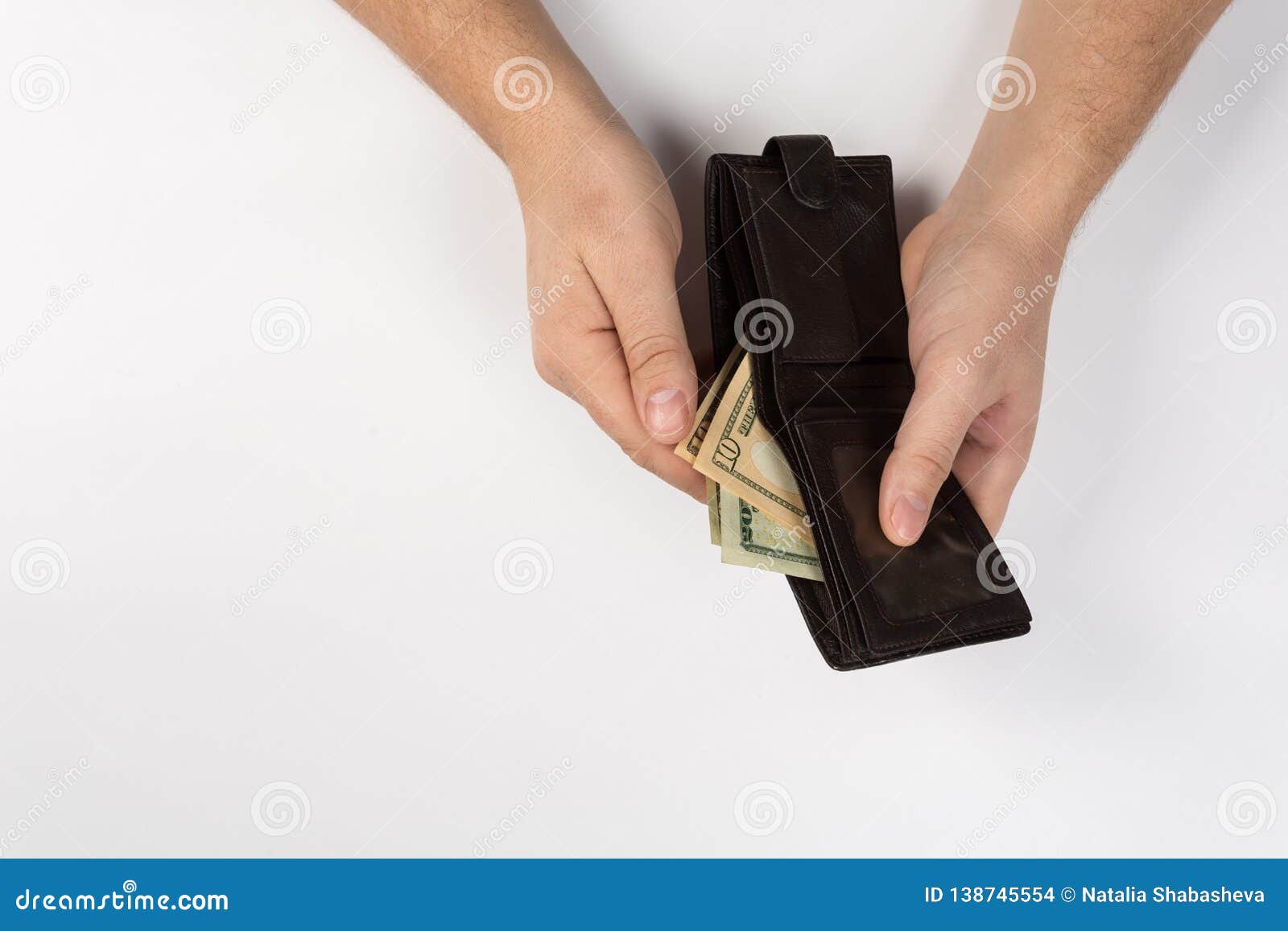 Empty wallet in his hands stock photo. Image of finance - 138745554
