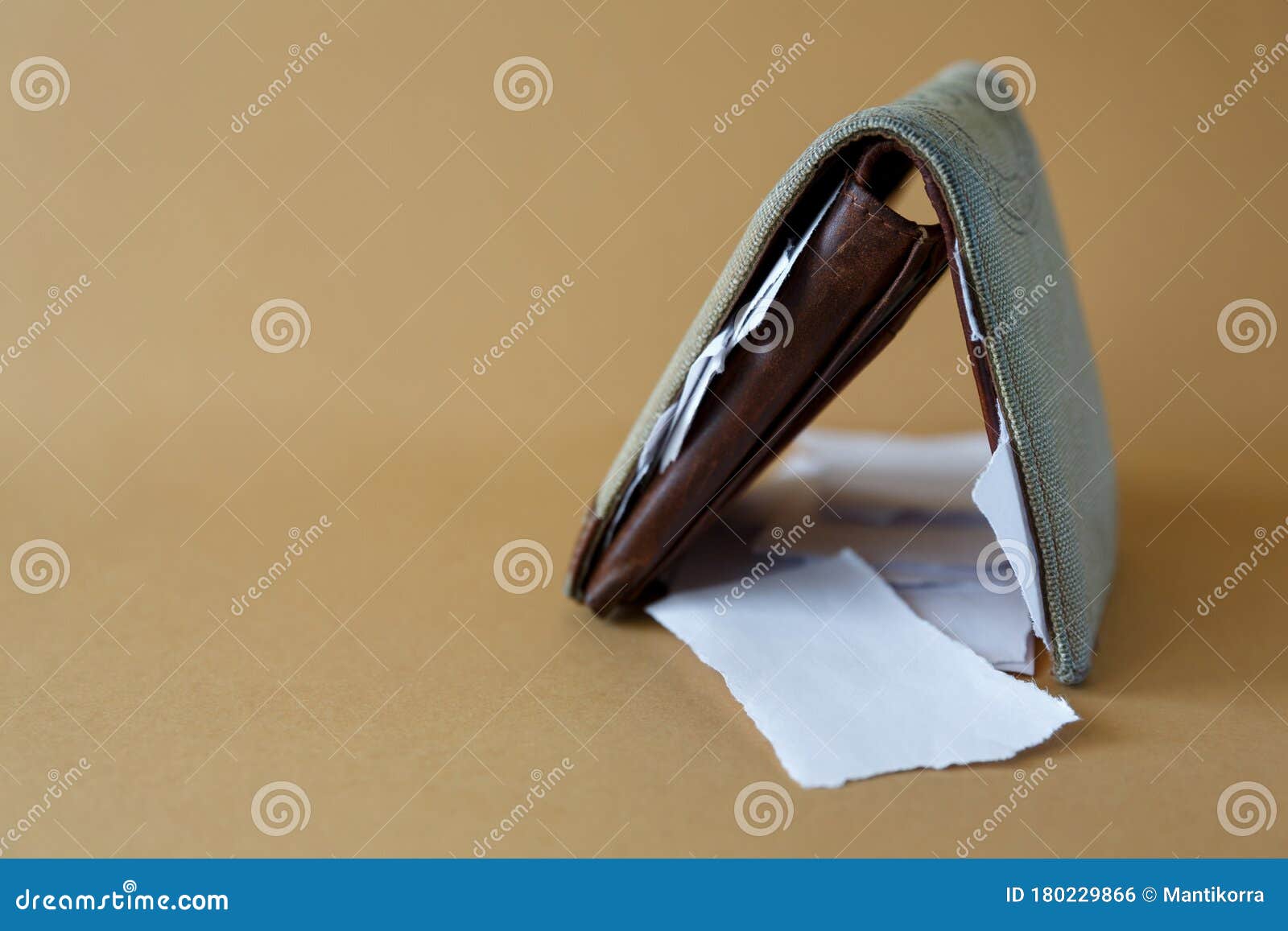 Empty Wallet with Pieces of Paper on a Plain Background Stock Photo ...
