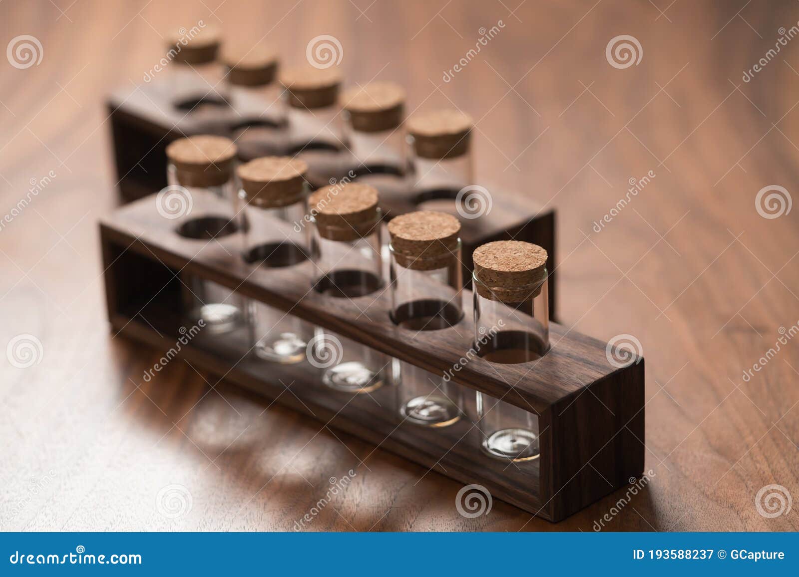 Empty Walnut Holder with Glass Tubes for Spices on Walnut Table Surface ...