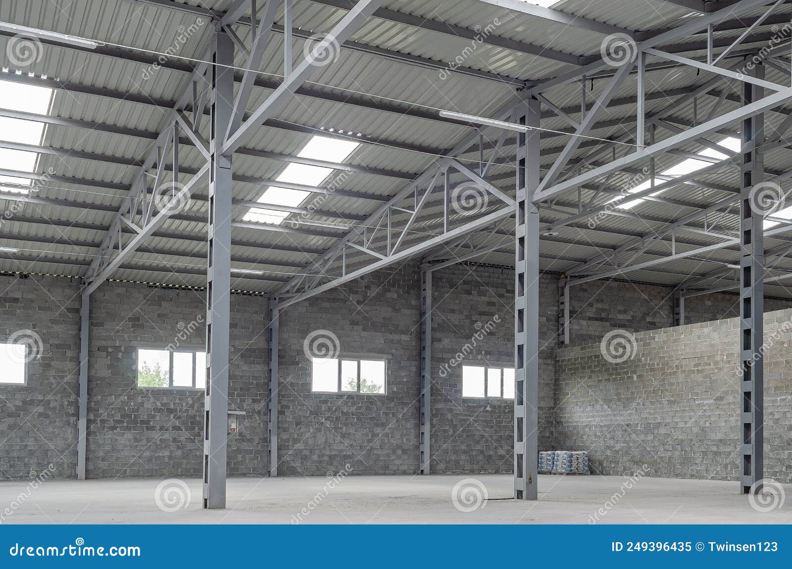 Empty Warehouse. Brick Walls, Windows in the Walls and Ceiling. Modern ...